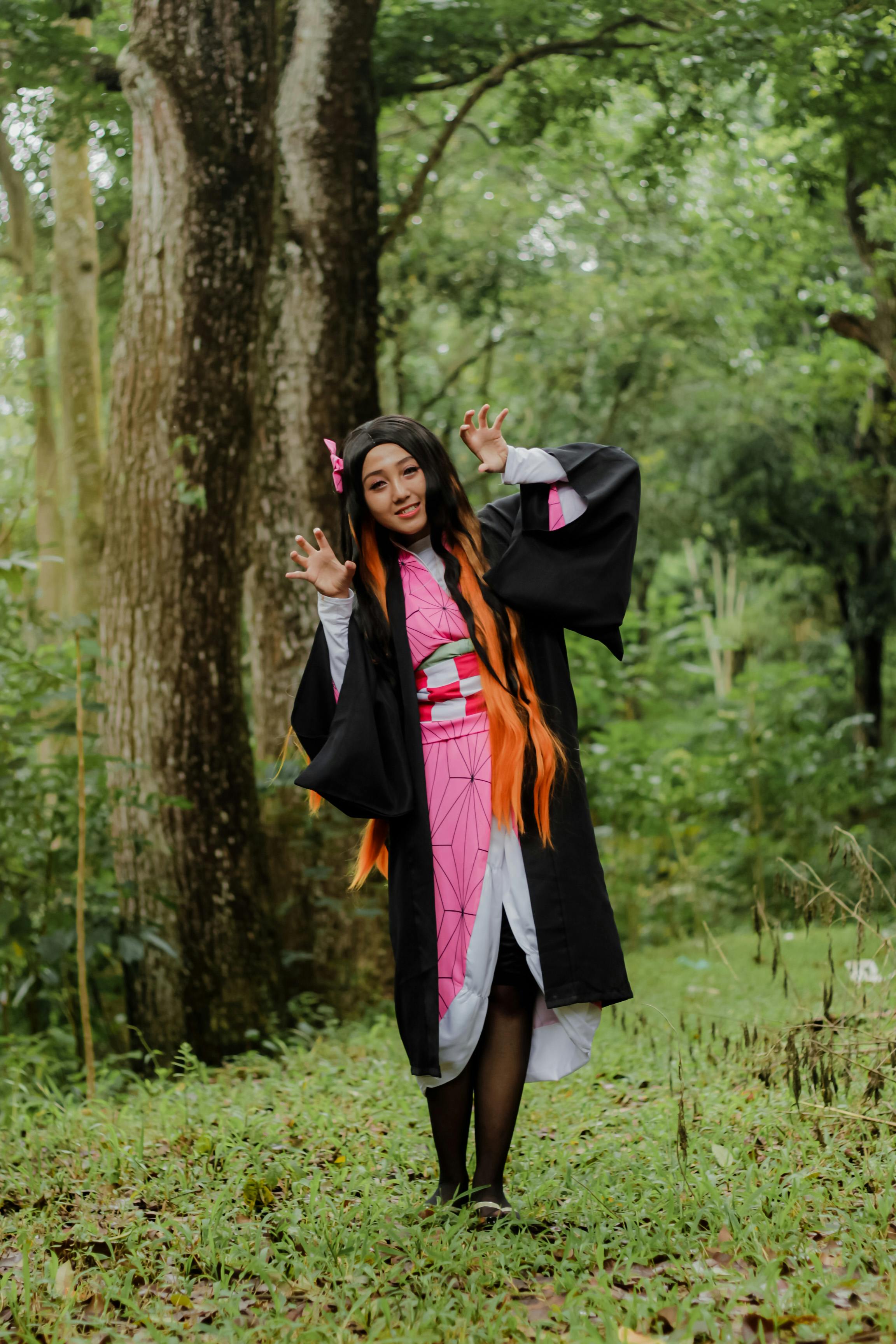 Girl Standing in a Park Wearing a Costume of an Anime Character · Free ...