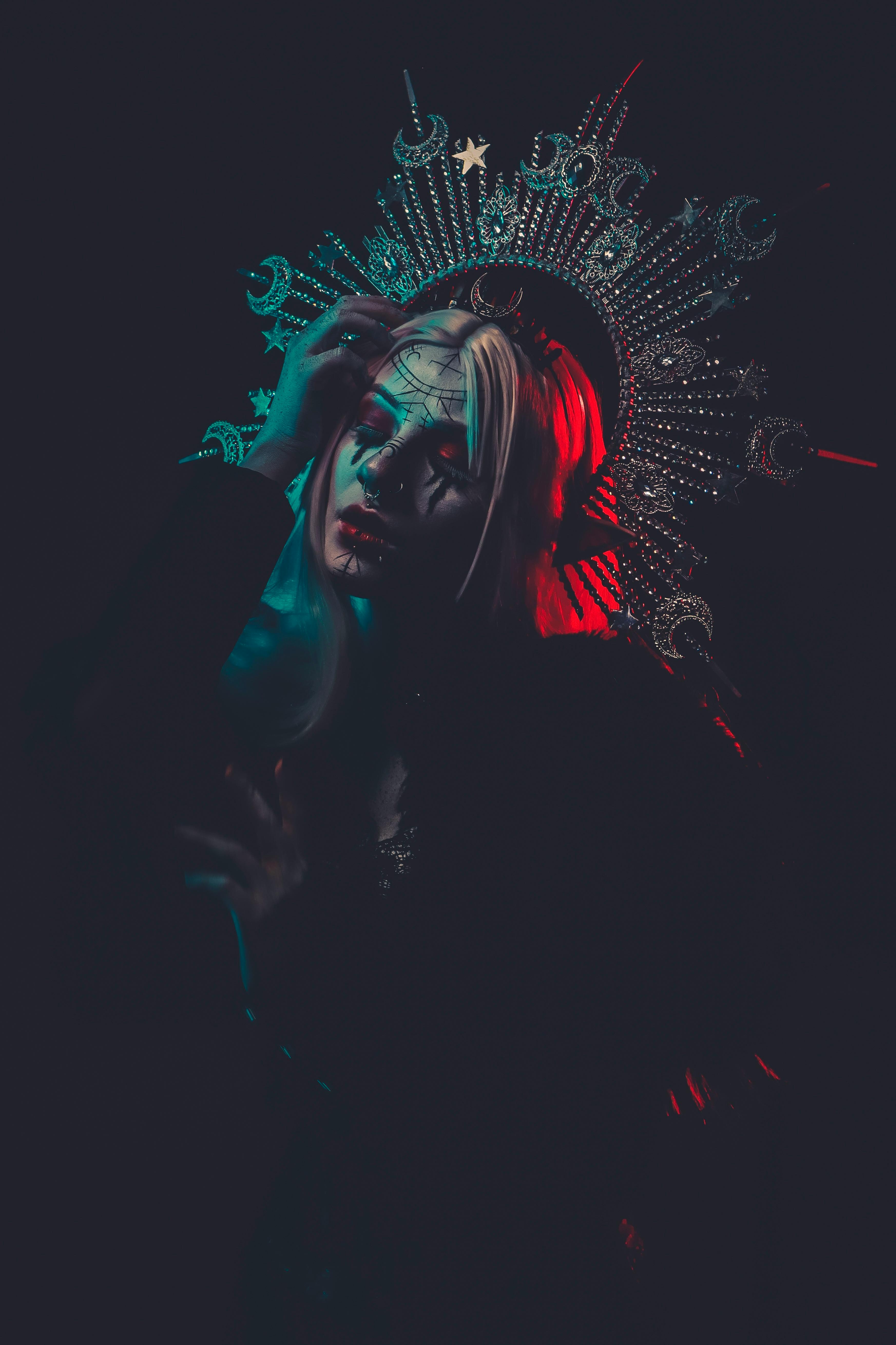 Young Woman Wearing a Costume and Artistic Makeup Posing in Studio in Split Lighting · Free ...