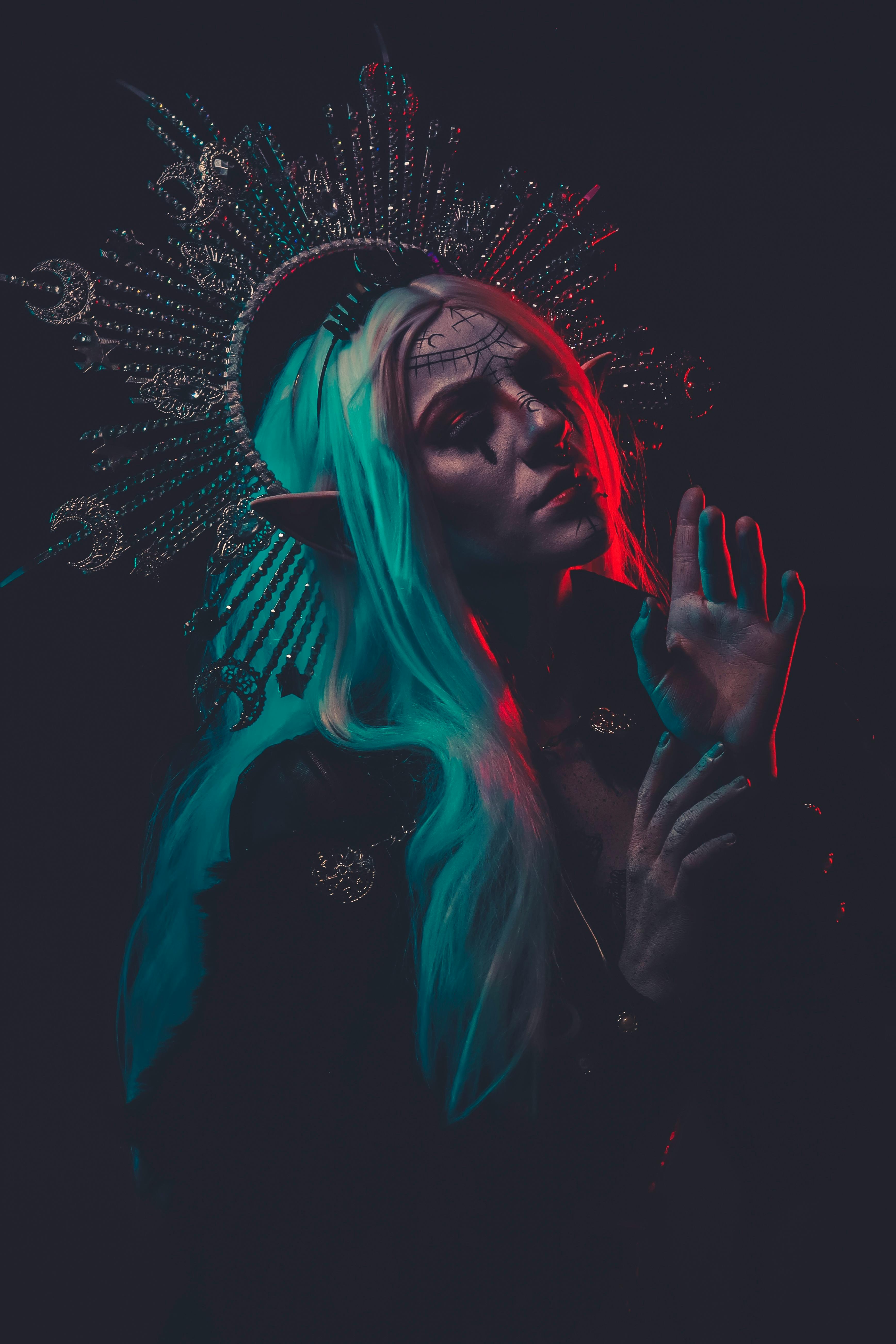 Woman in Elfa Costume on Black Background · Free Stock Photo