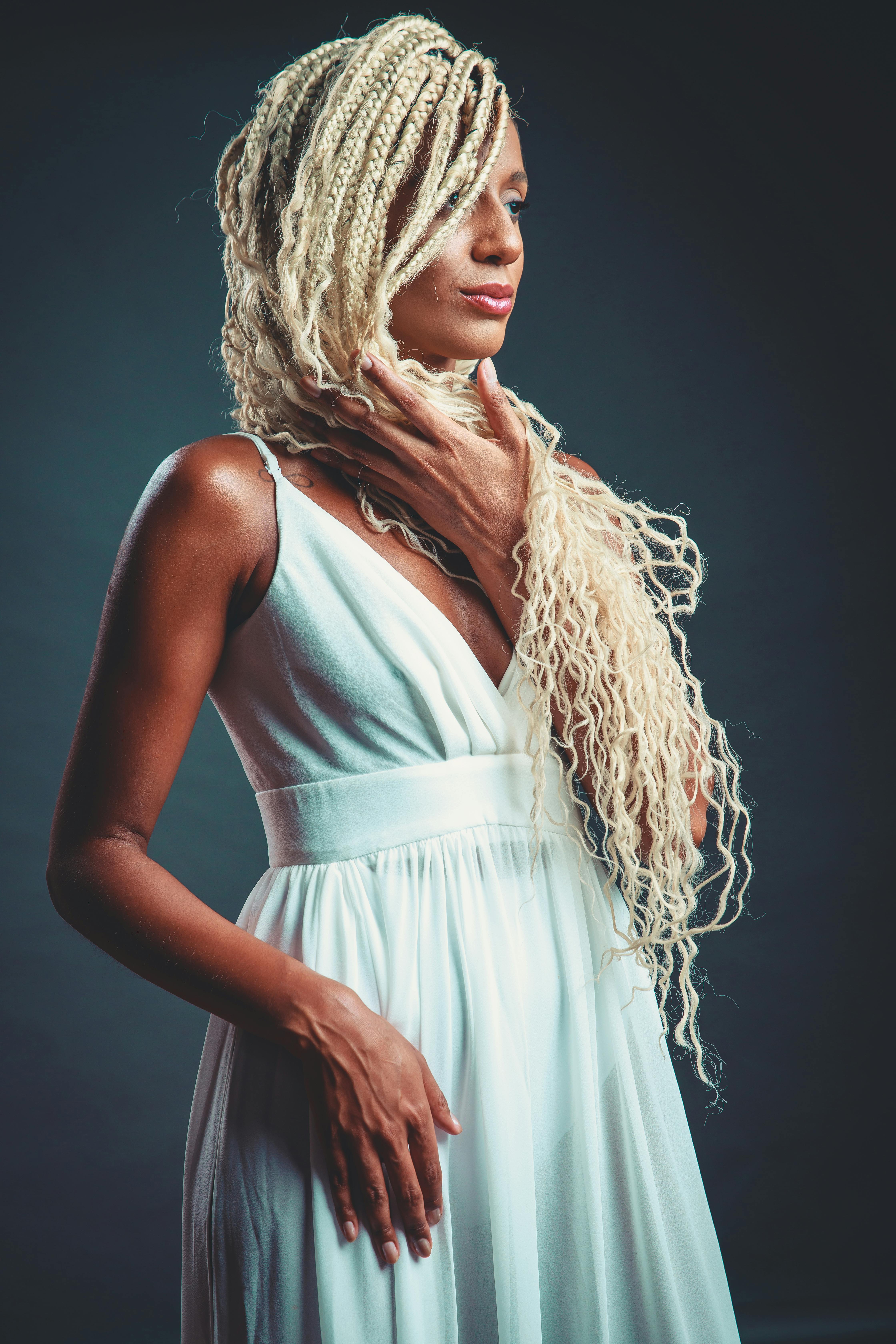 Woman Posing on Black Background · Free Stock Photo