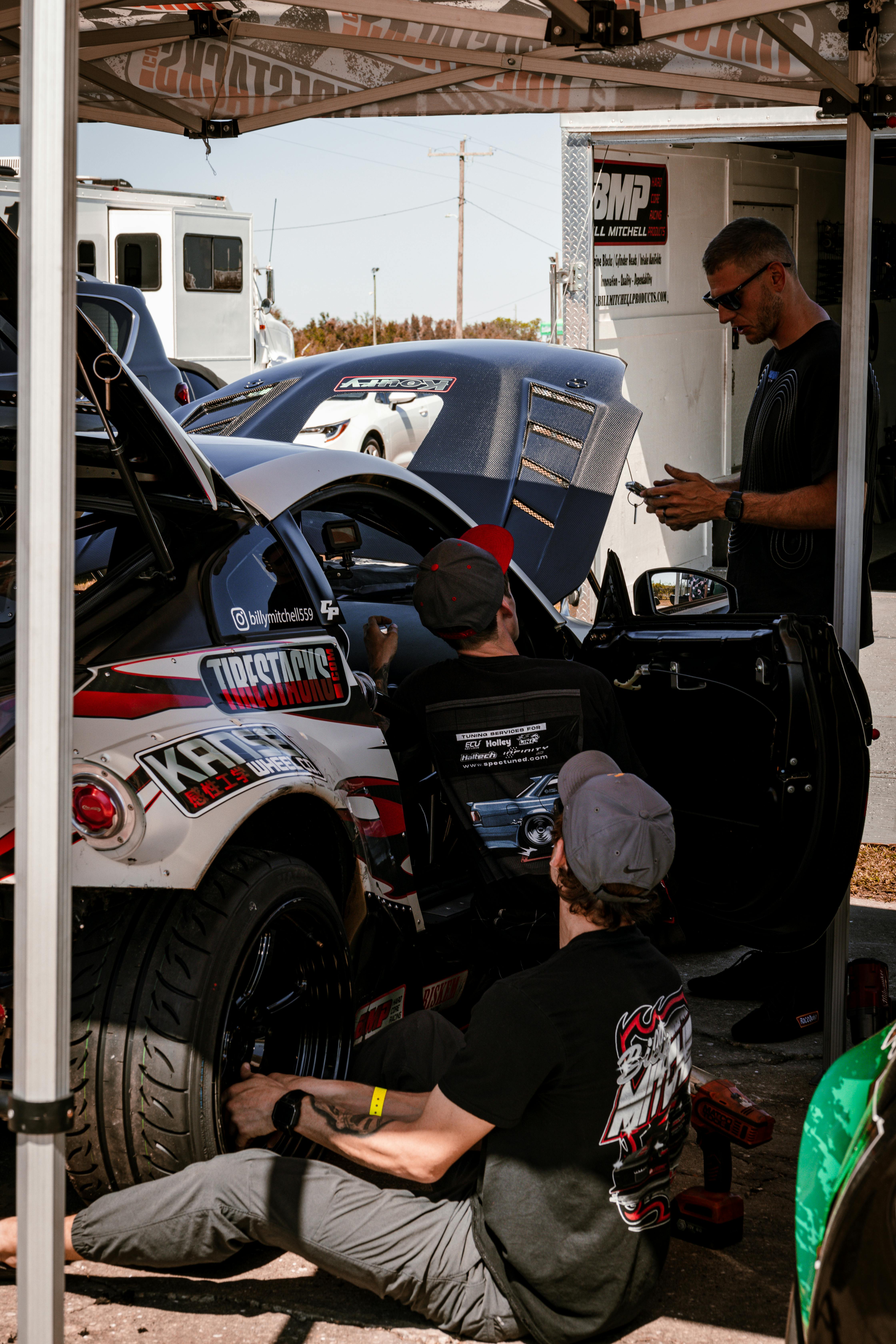 Mechanics Prepping The Race Car · Free Stock Photo