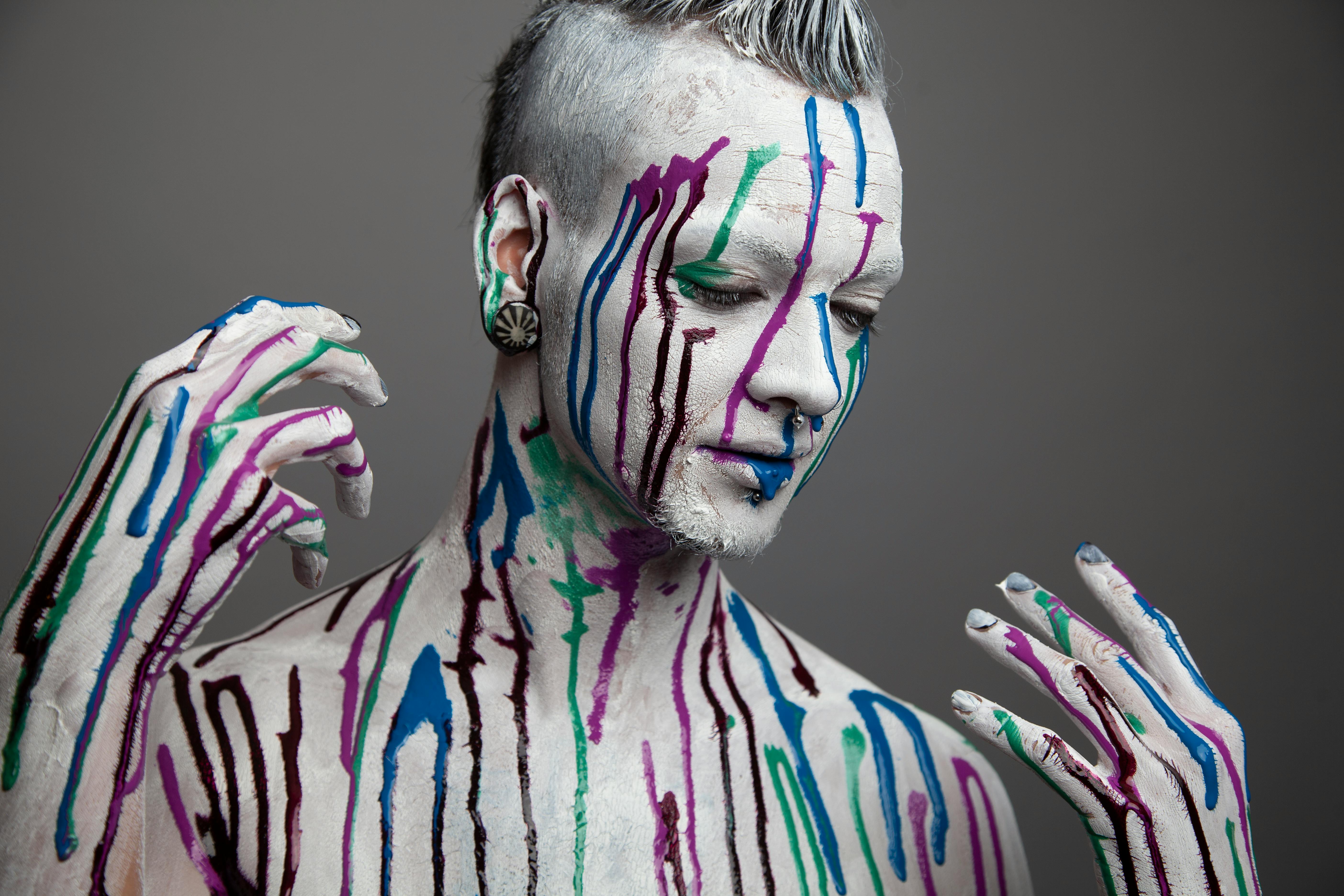 Man with his arm raised · Free Stock Photo