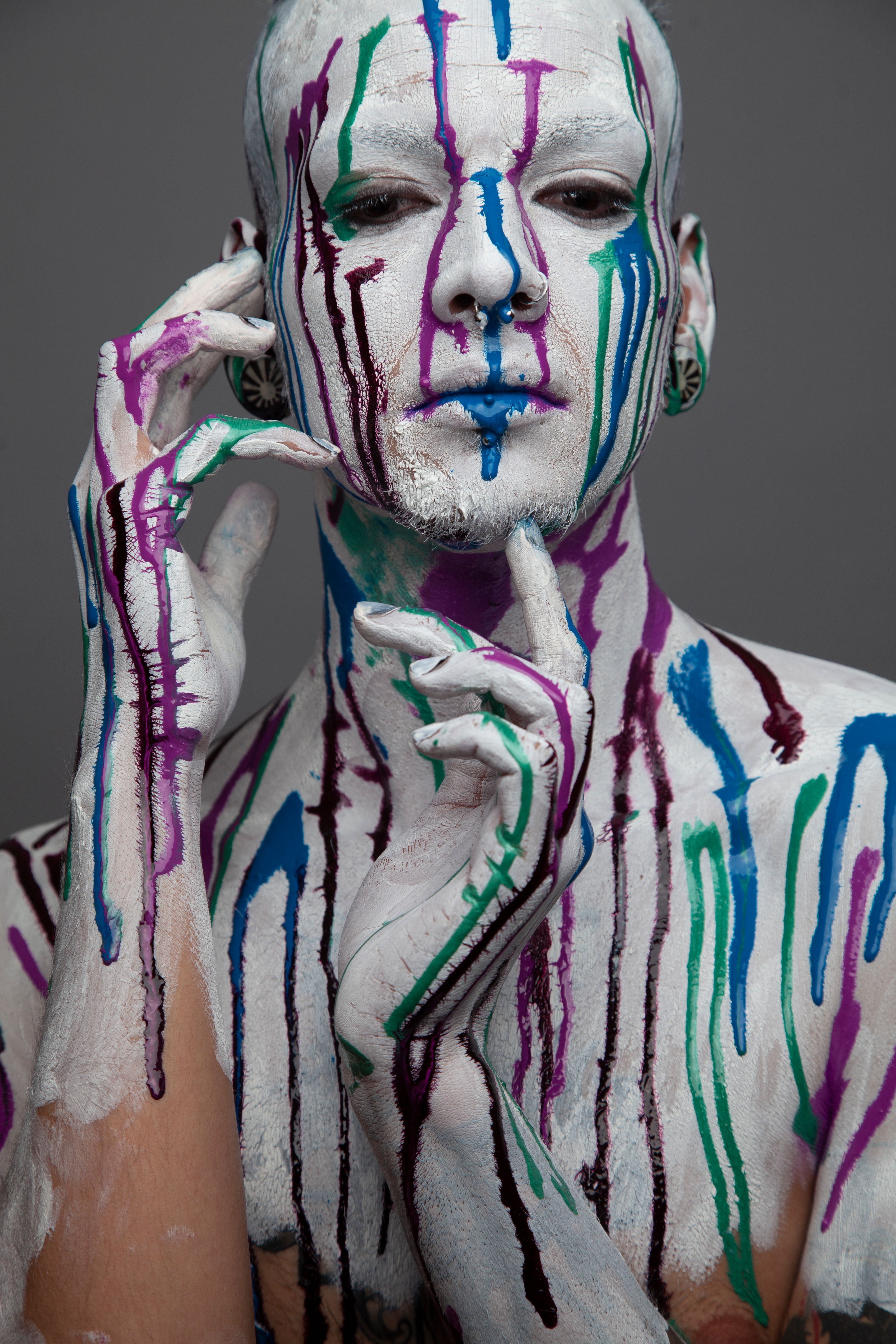 Man Posing with Paint on Face · Free Stock Photo