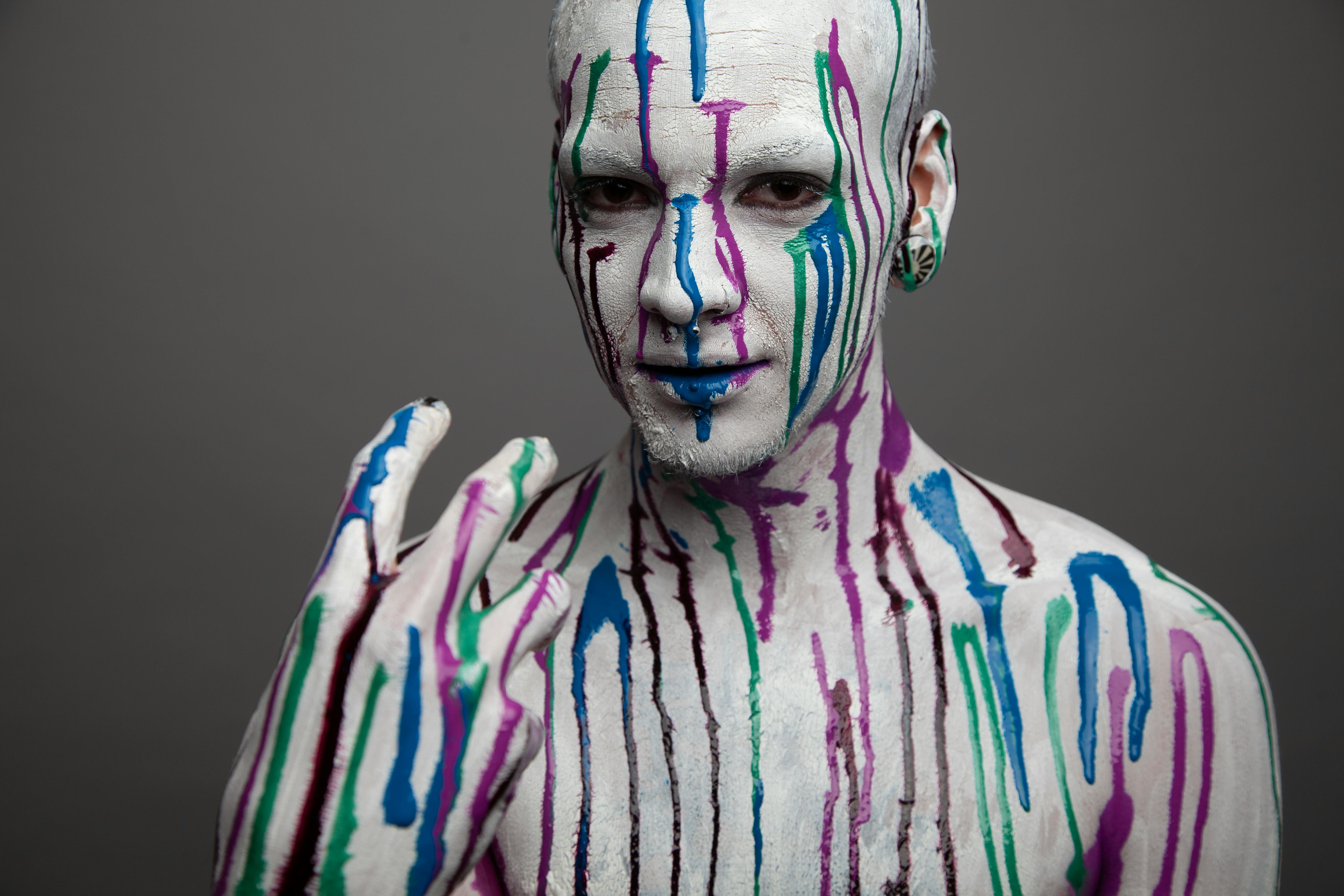 Portrait Of Man With Face Paint · Free Stock Photo
