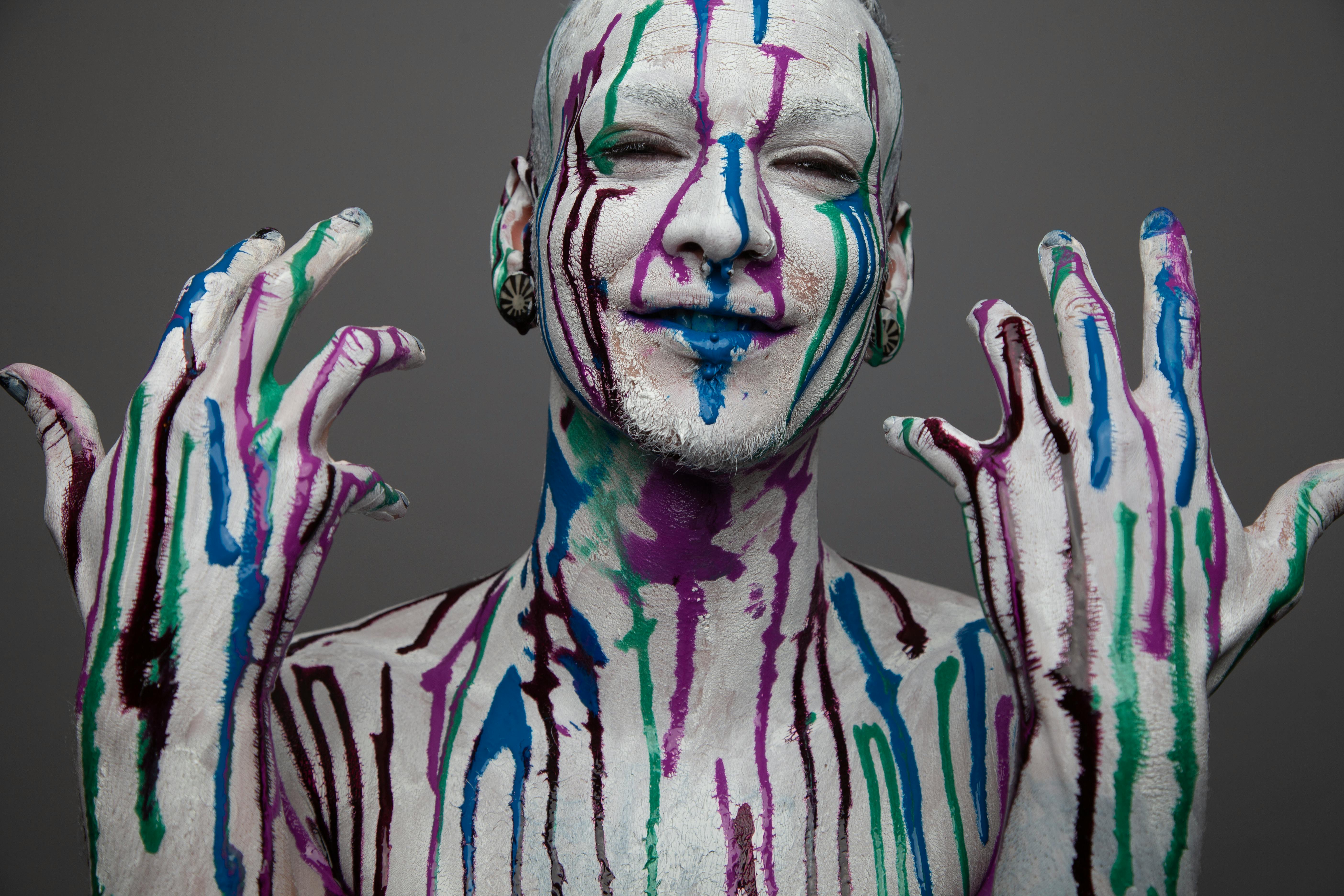 Person With Blue Paint on Face · Free Stock Photo