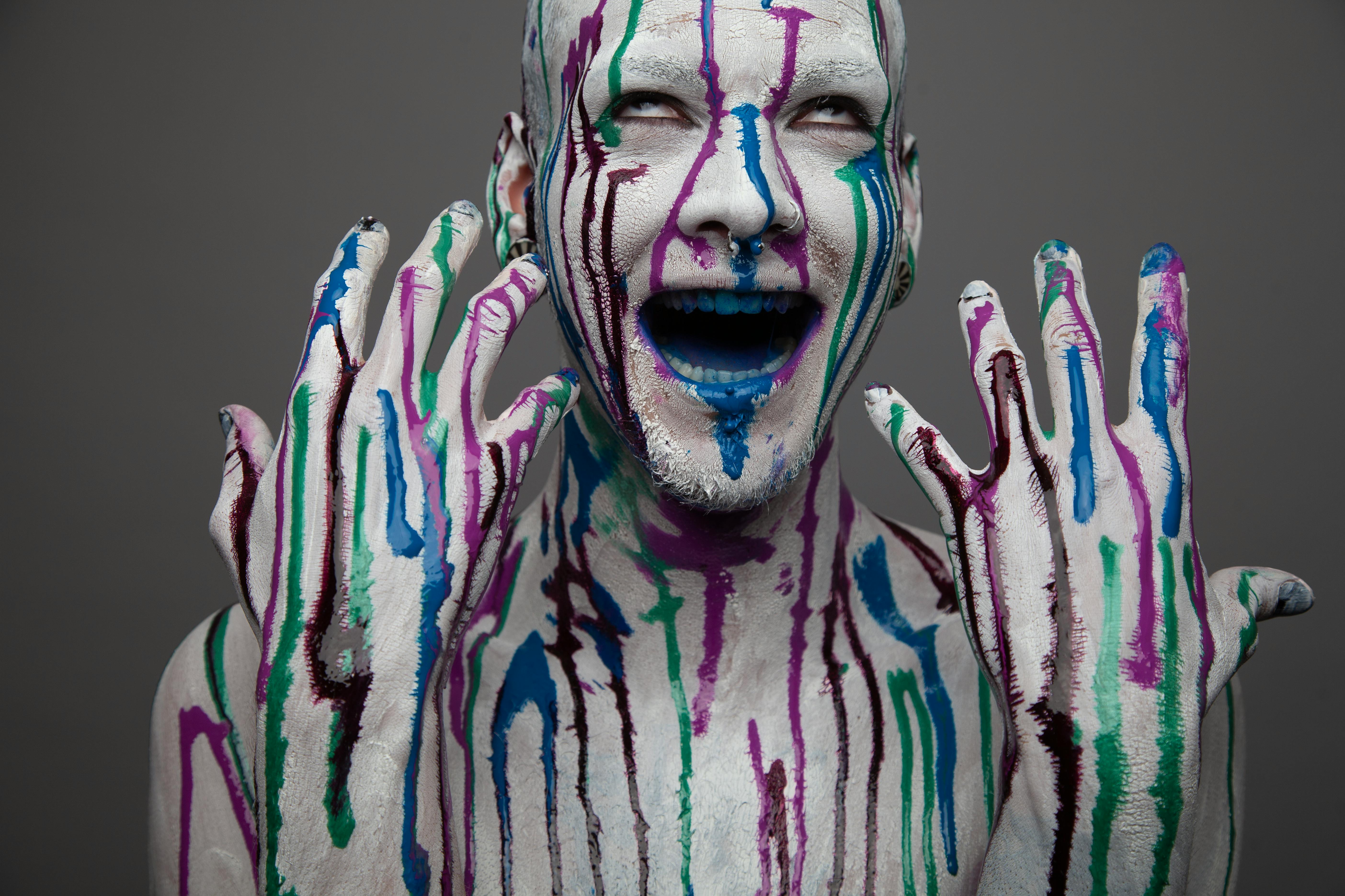 Shouting Man with Colorful Paint on Face · Free Stock Photo