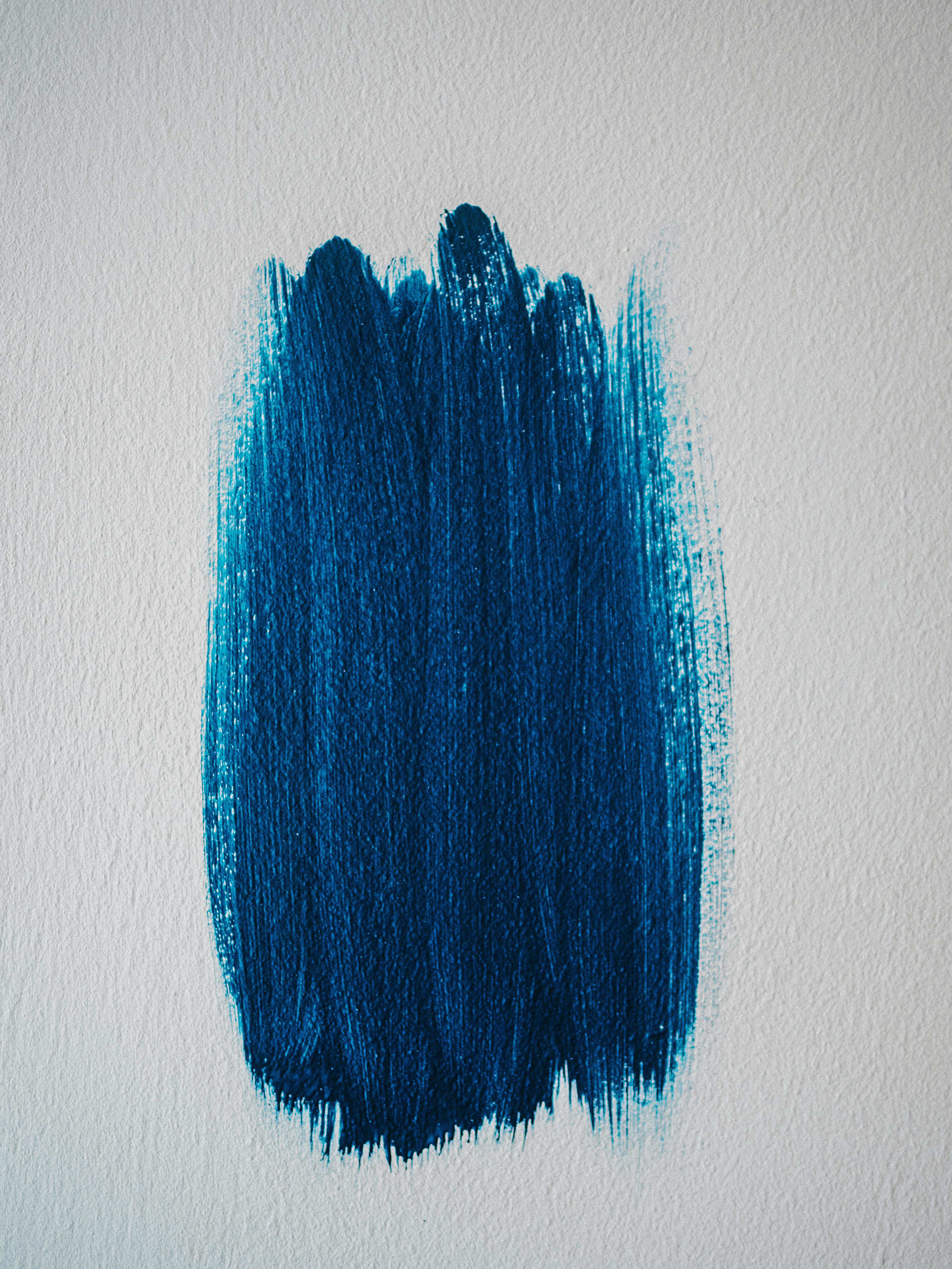 Blue Paint on White Wall · Free Stock Photo