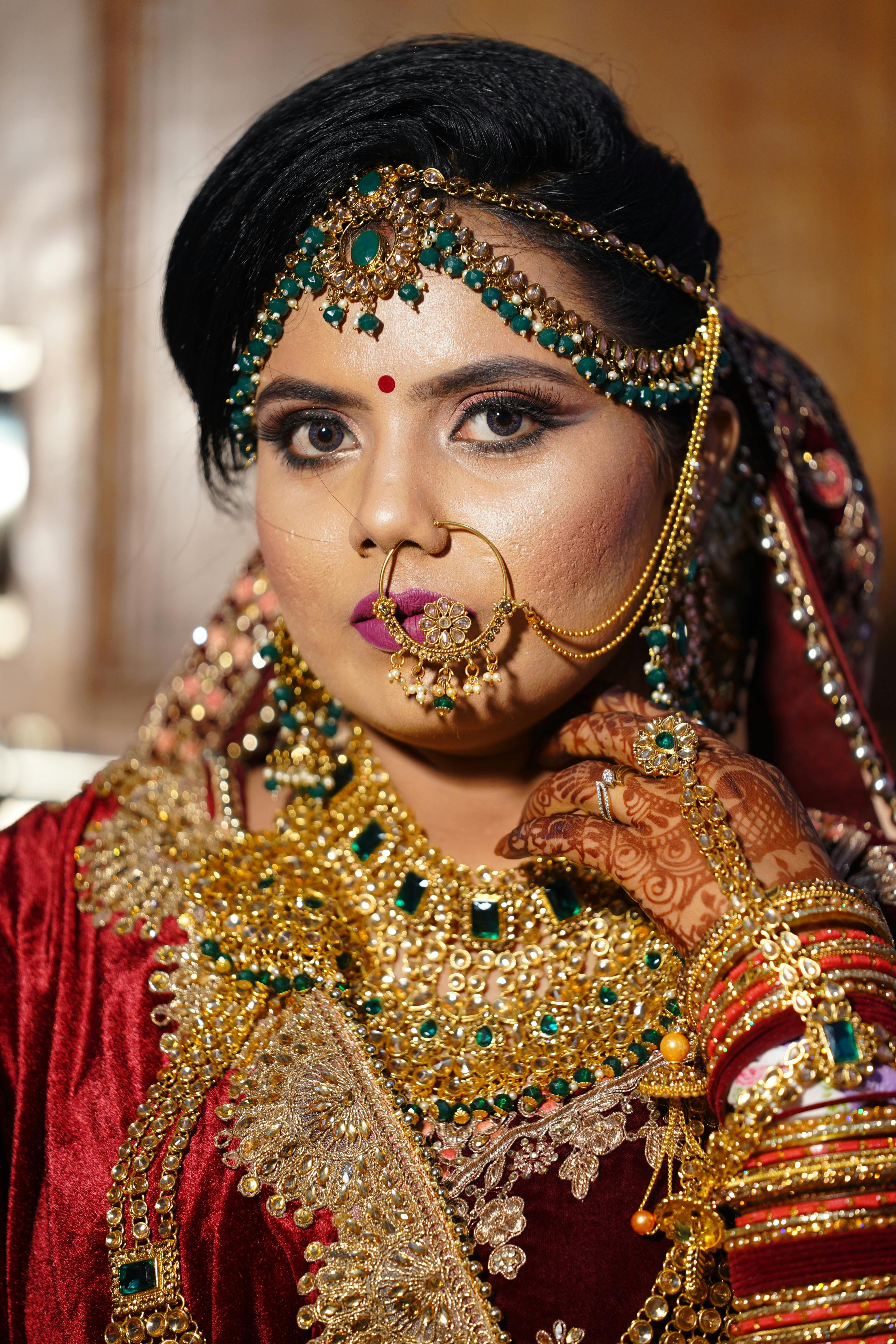 Portrait of a Bride in Traditional Clothing and Jewelry · Free Stock Photo