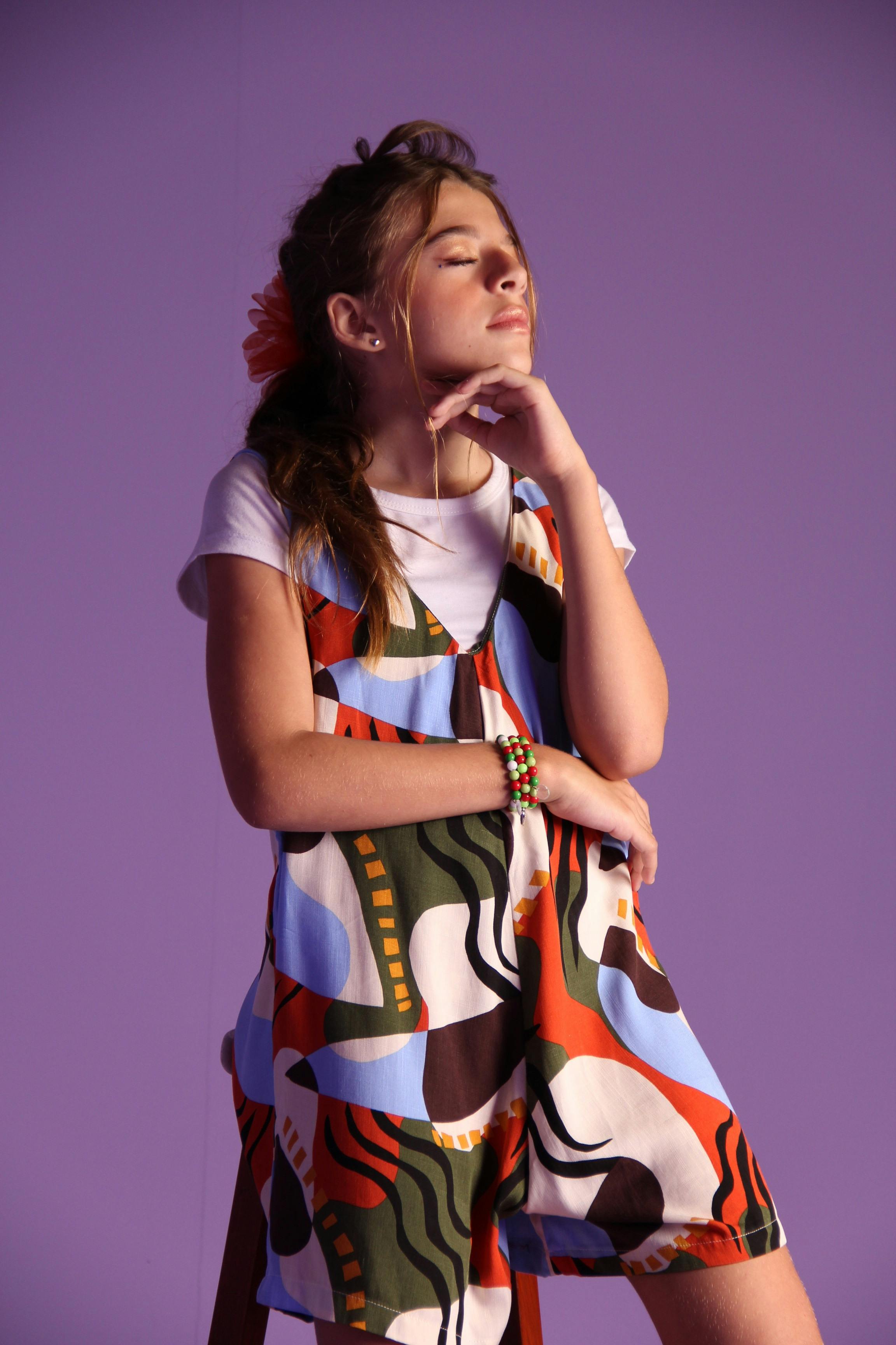 Woman in Golden Dress Standing in Sunlight with Eyes Closed · Free ...