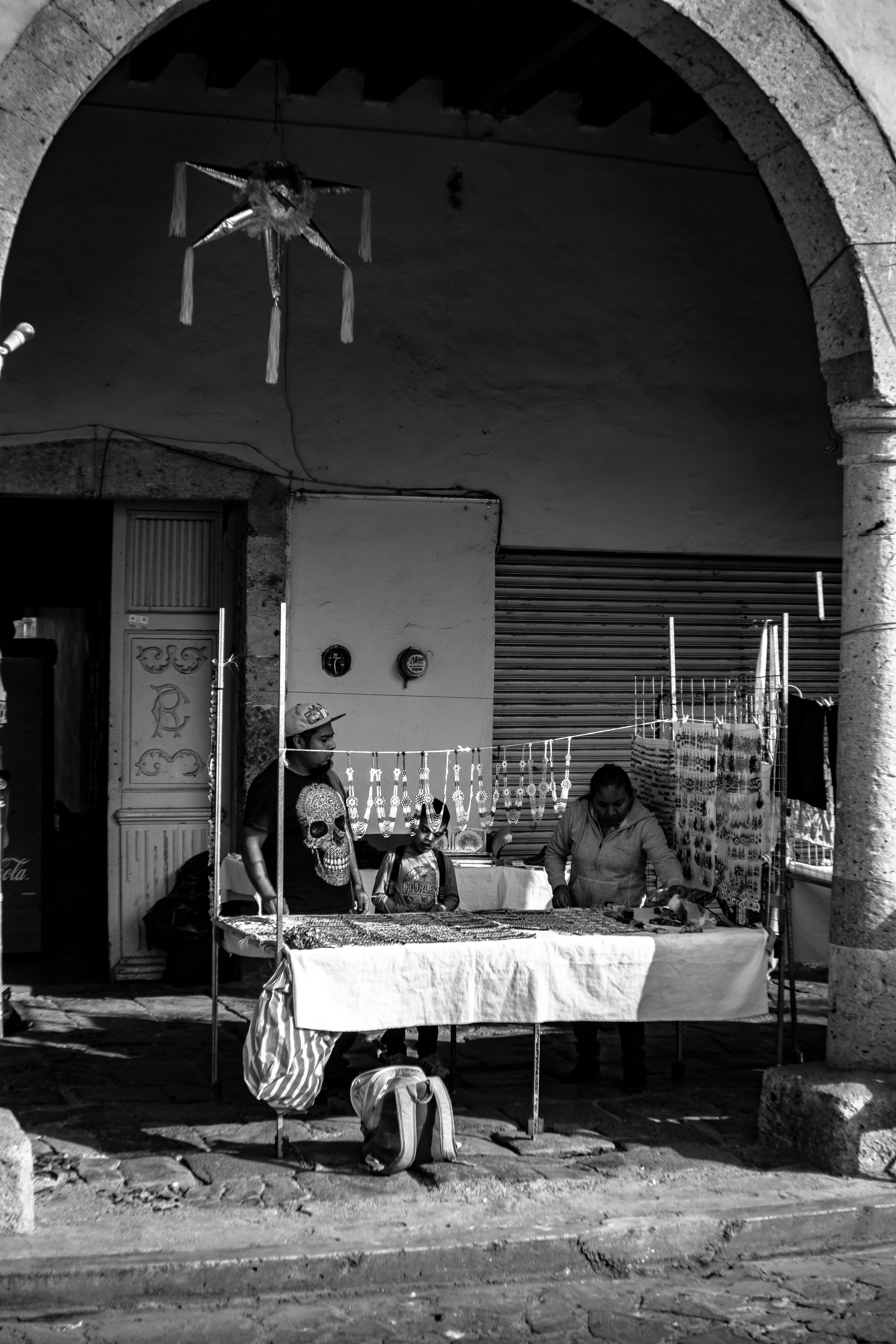 Two People Selling on a Street · Free Stock Photo