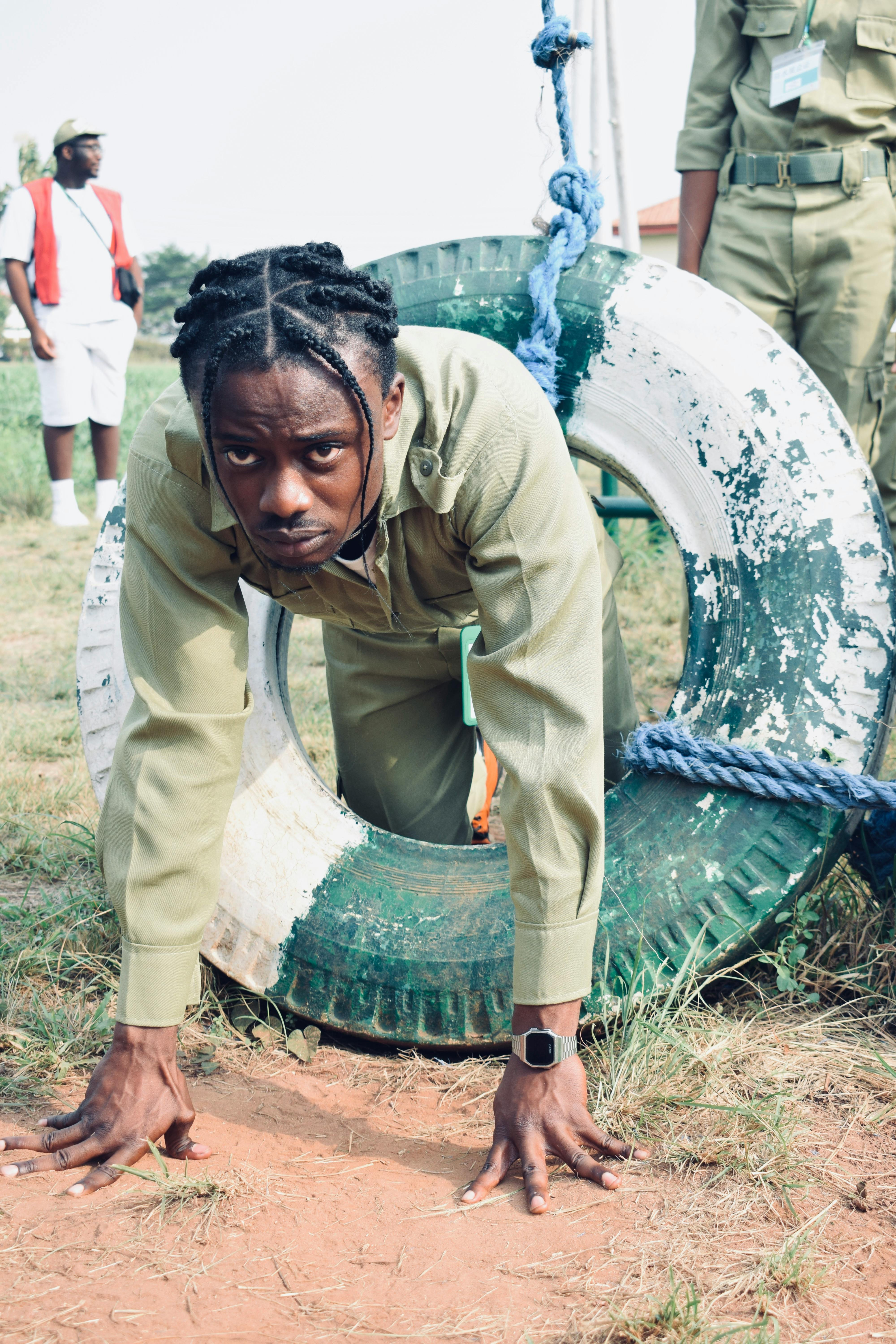 Black Man Going Through an Obstacle Course · Free Stock Photo