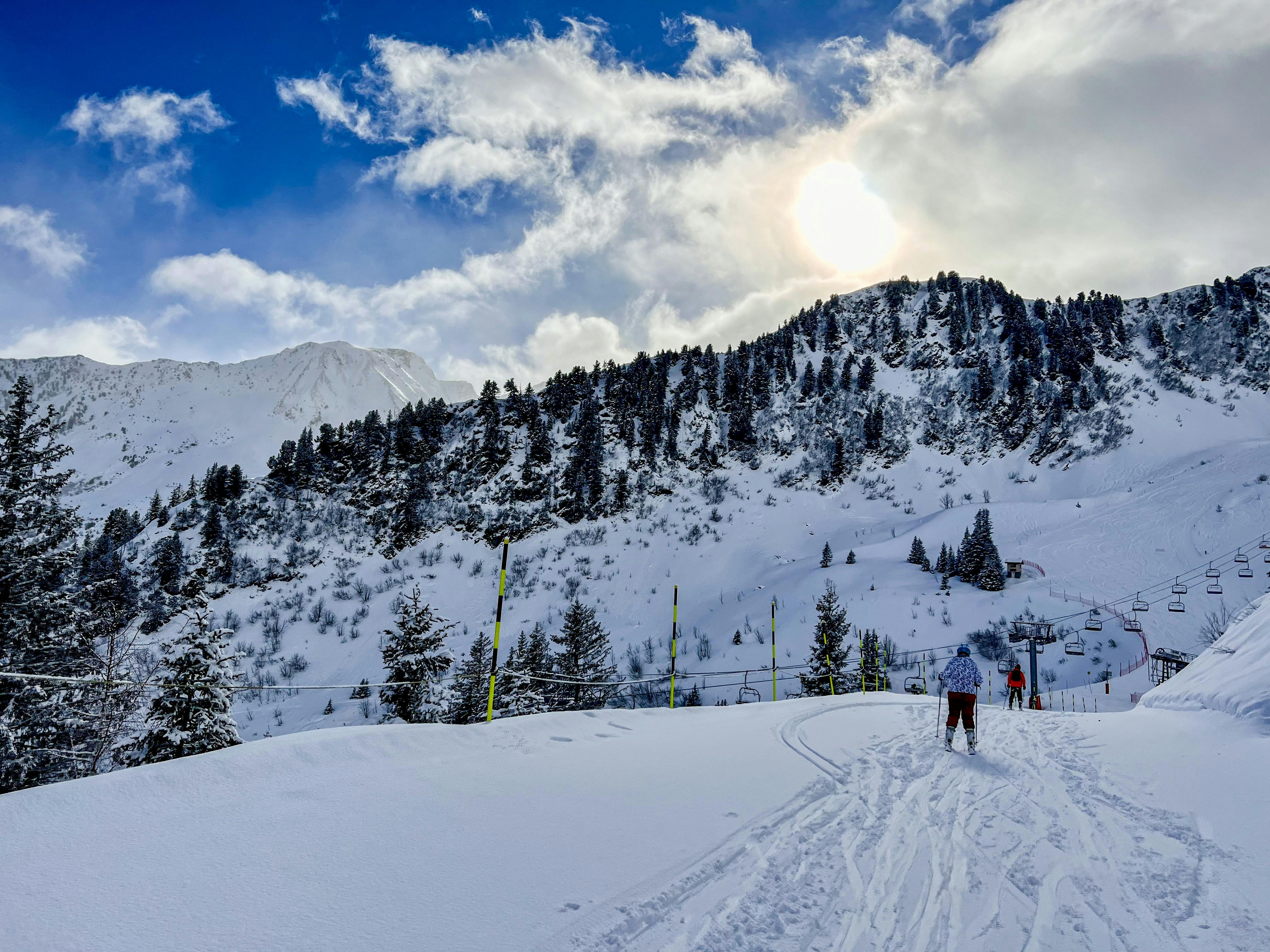 Man Walking on Snow Covered Mountain · Free Stock Photo