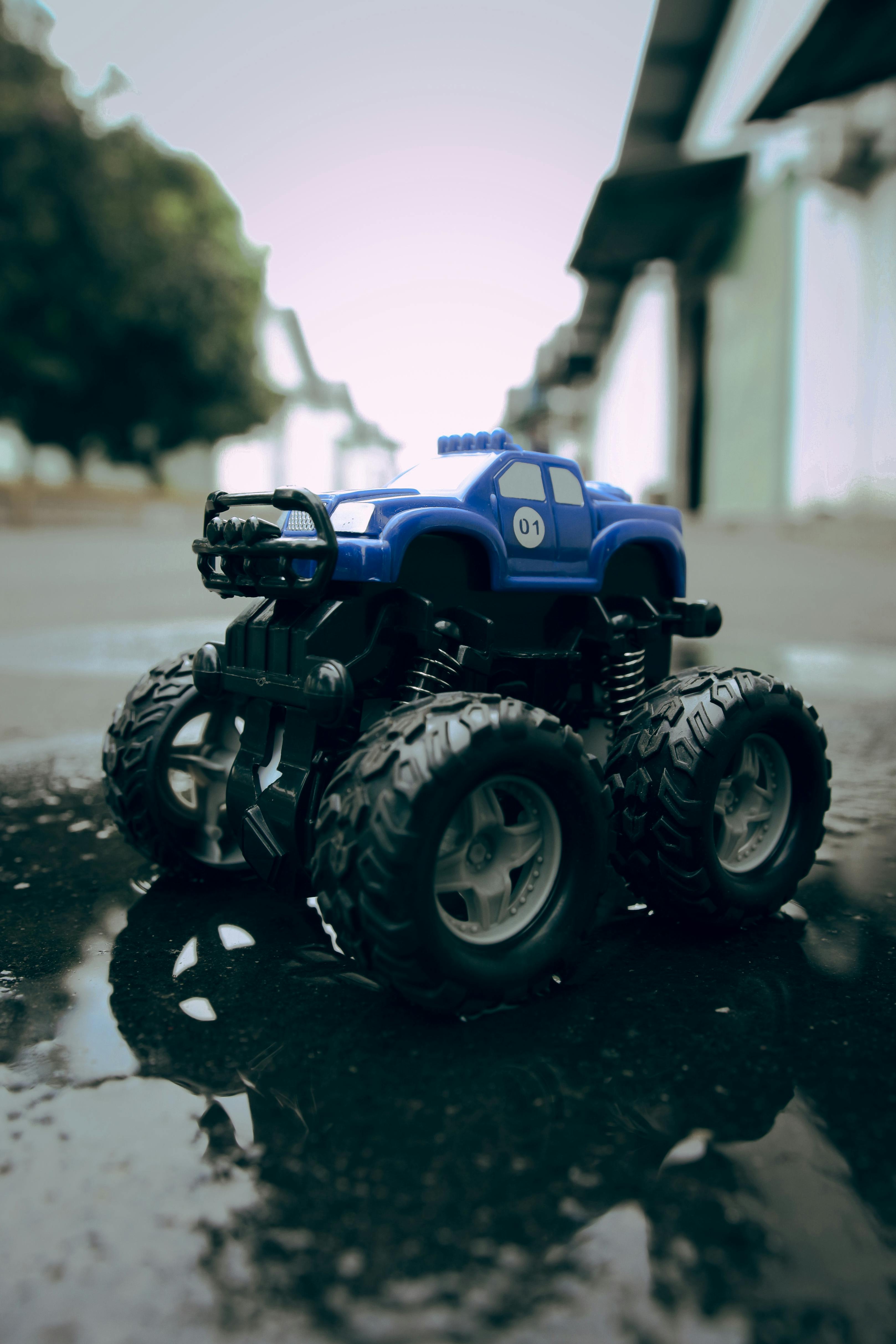Toy Monster Truck in Puddle · Free Stock Photo