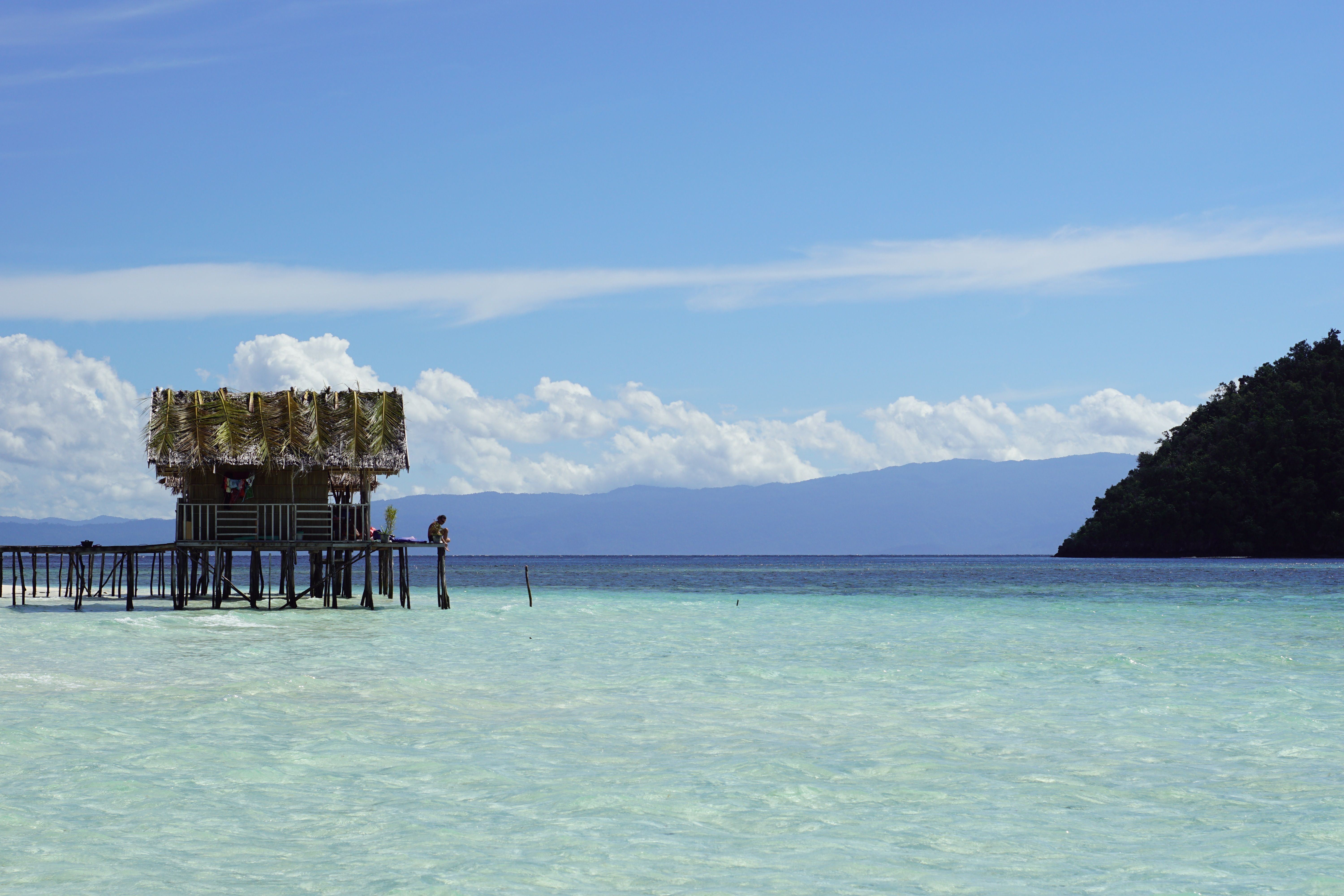 Cottage on Pier on Tropical Sea Shore · Free Stock Photo
