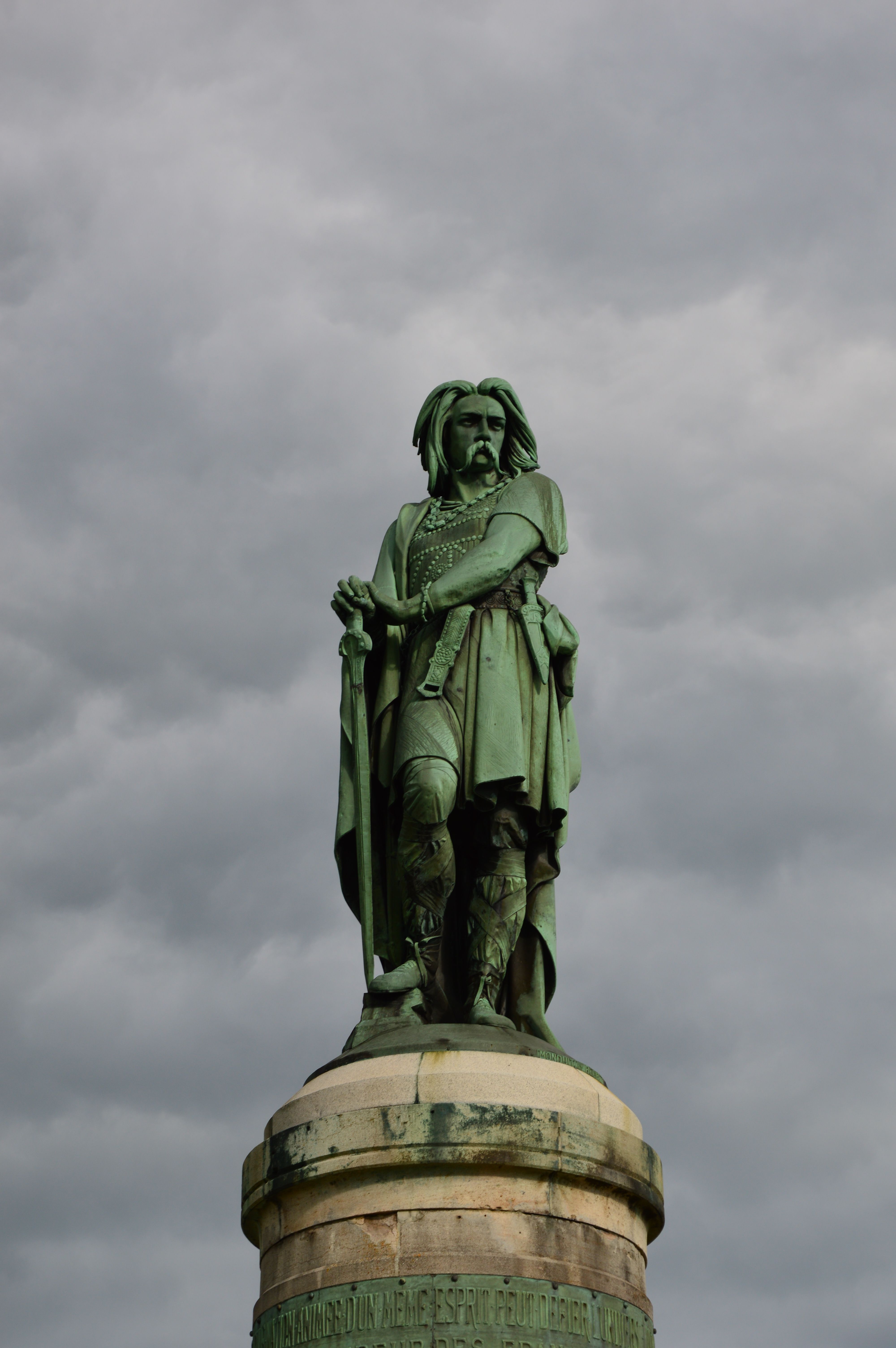 Statue against a Cloudy Sky · Free Stock Photo