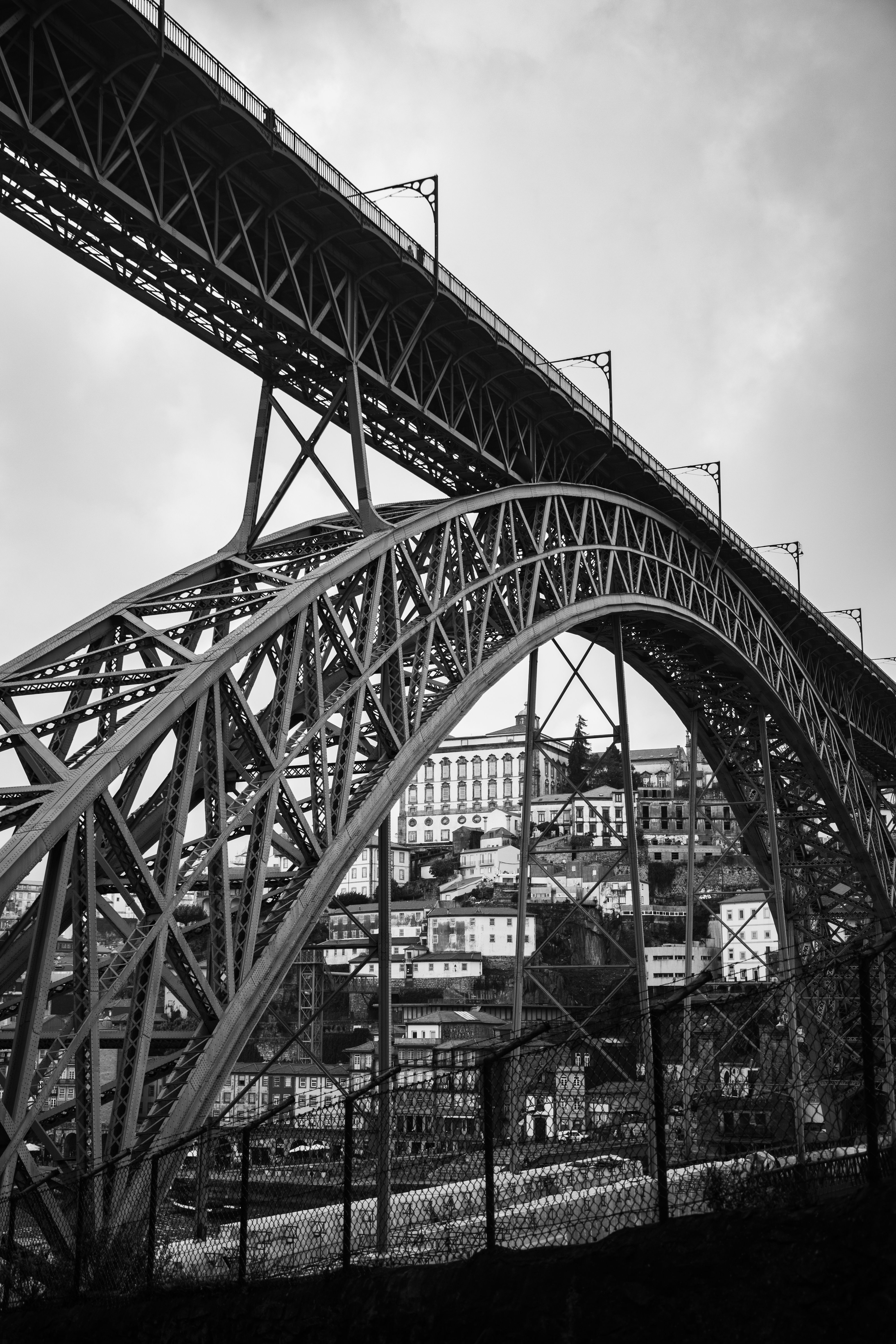 Monochrome Photo of a Steel Bridge · Free Stock Photo