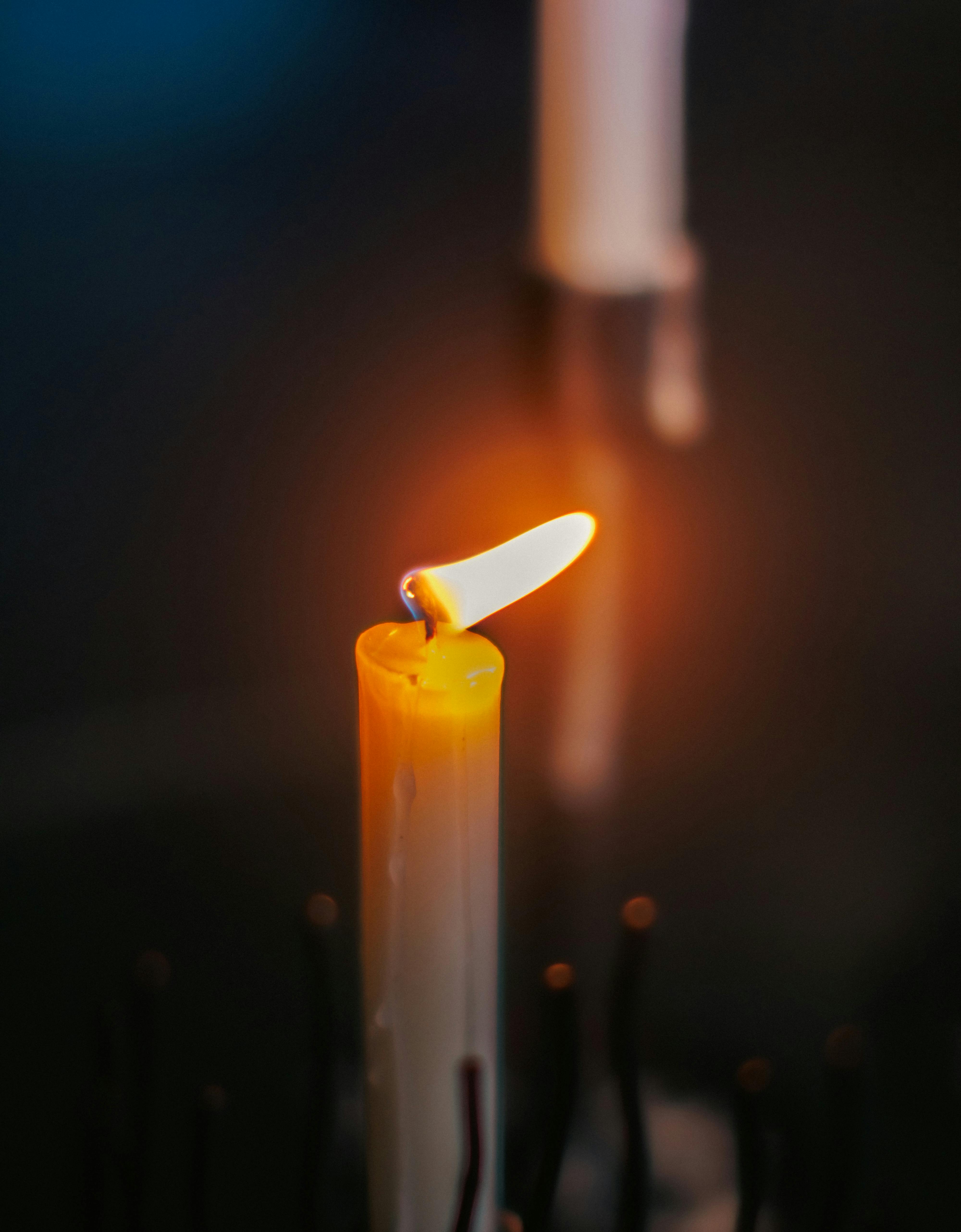 Close-up of a Vertical Candle Burning · Free Stock Photo