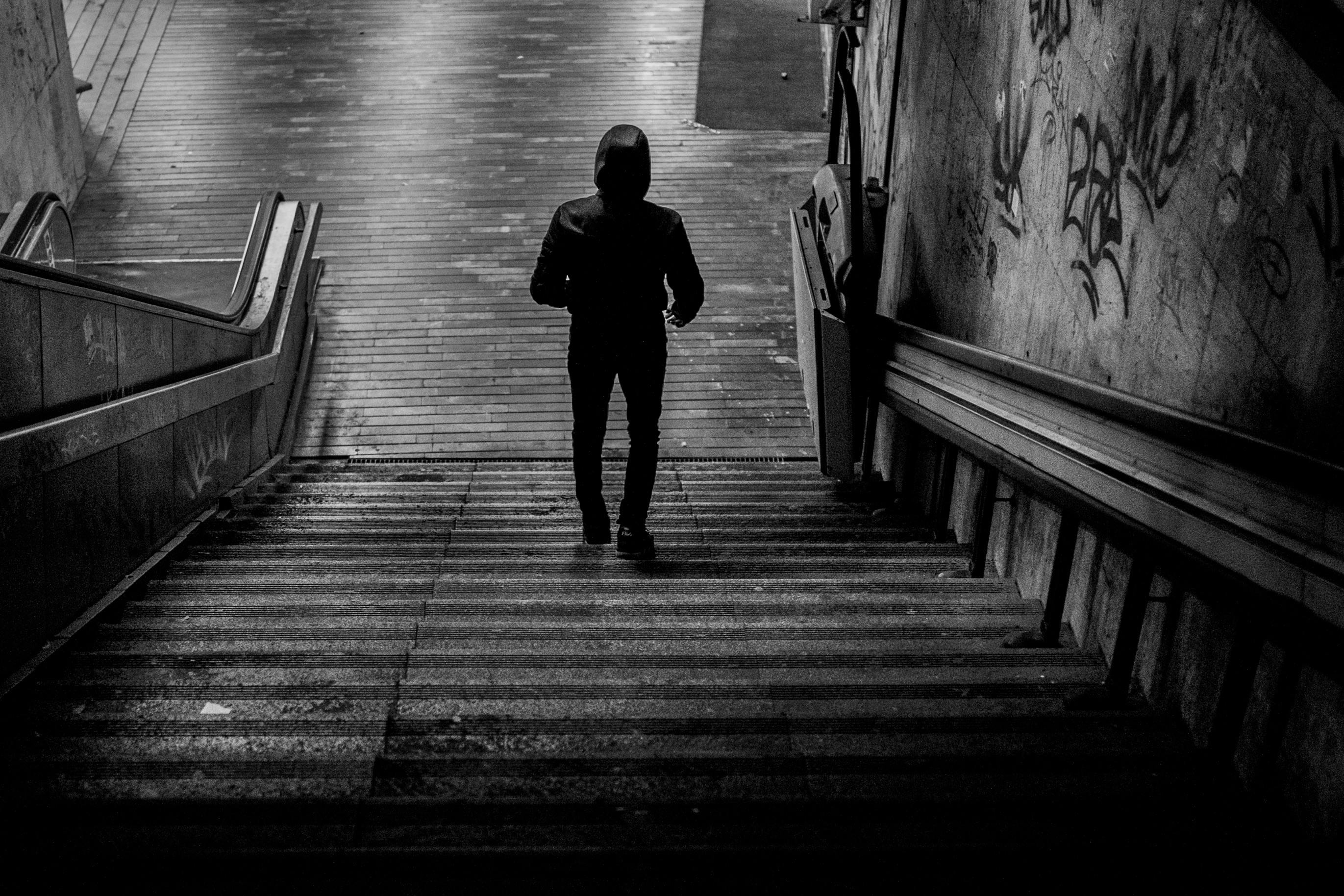 Person Walking Up the Stairs · Free Stock Photo
