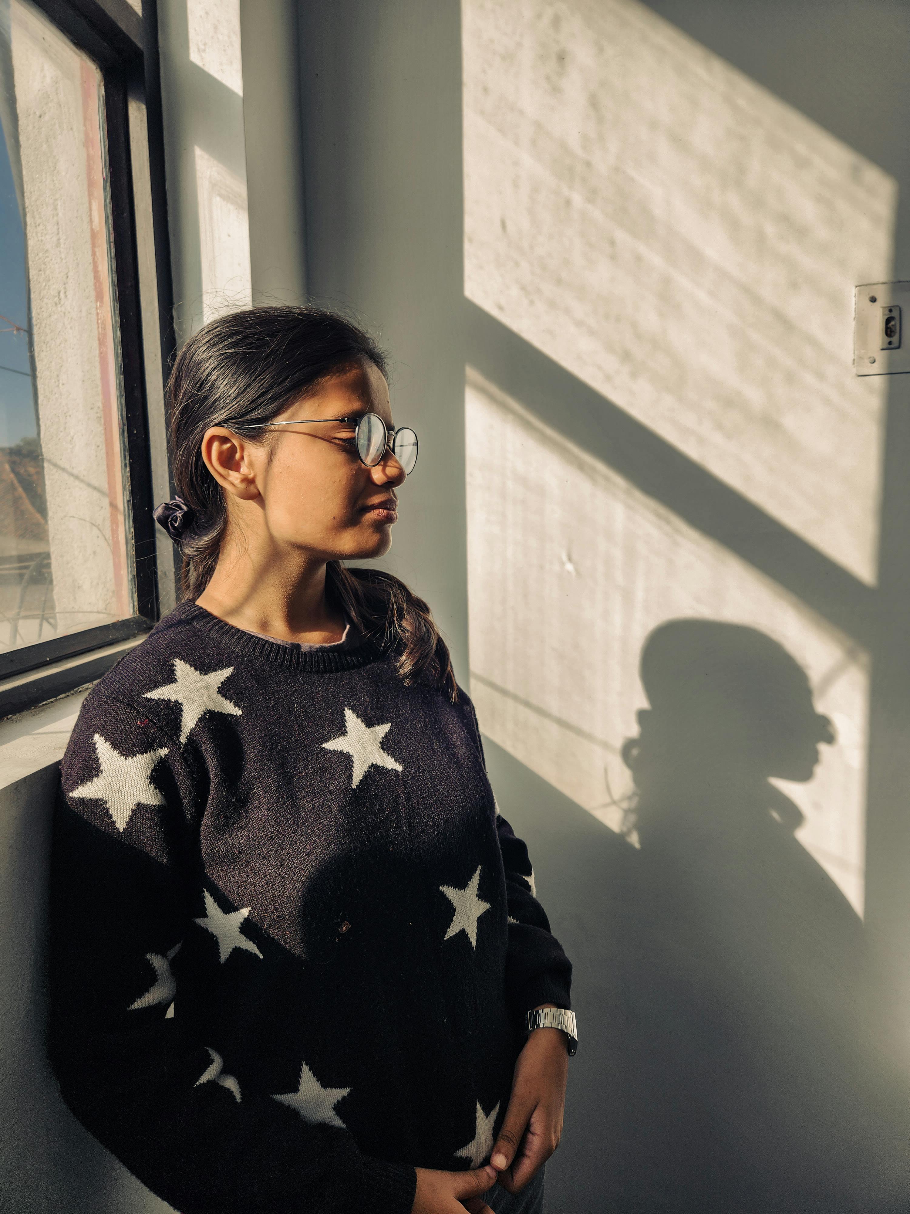 Woman Standing in Sunlight · Free Stock Photo