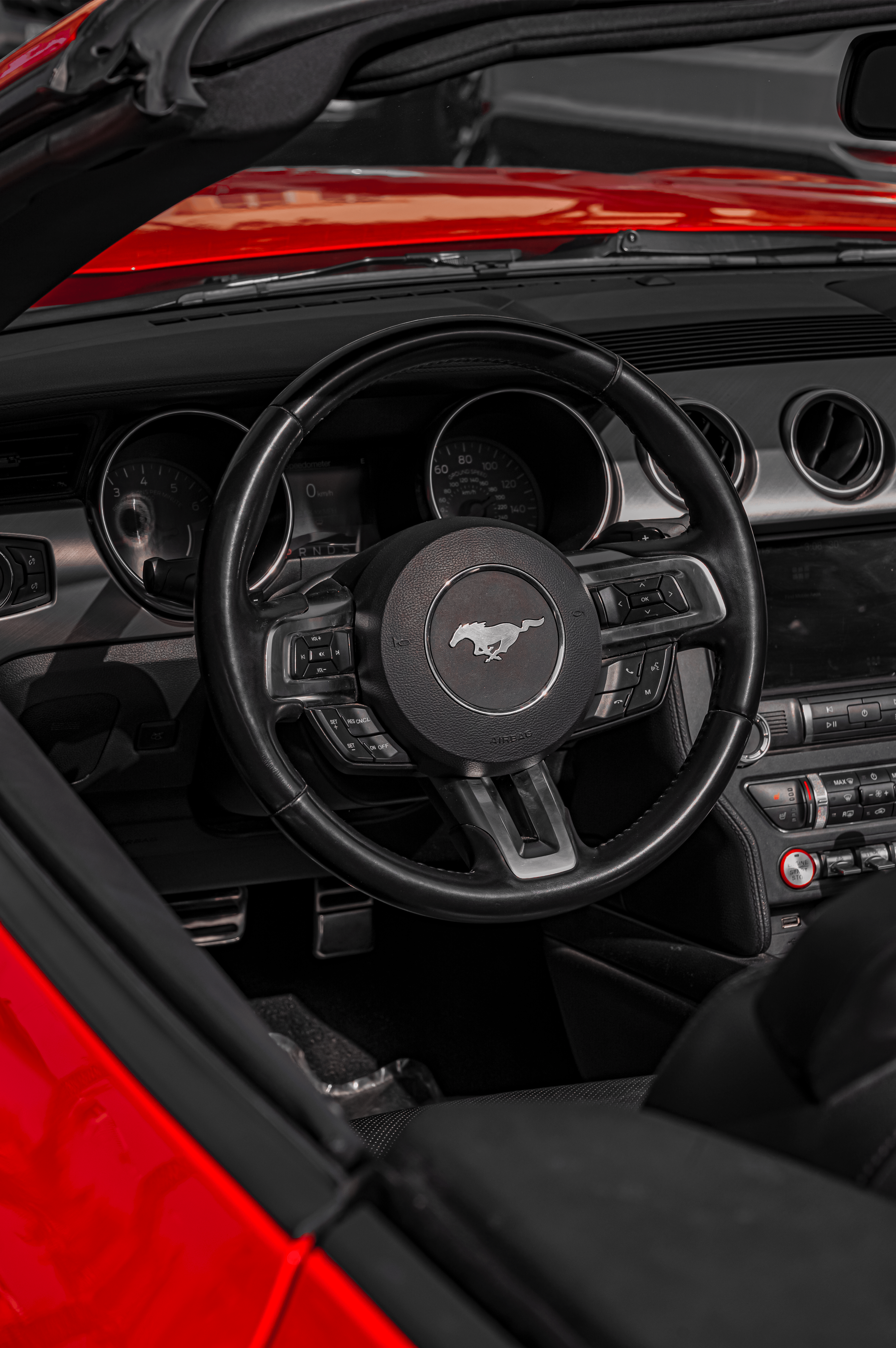 Steering Wheel of a Ford Mustang · Free Stock Photo