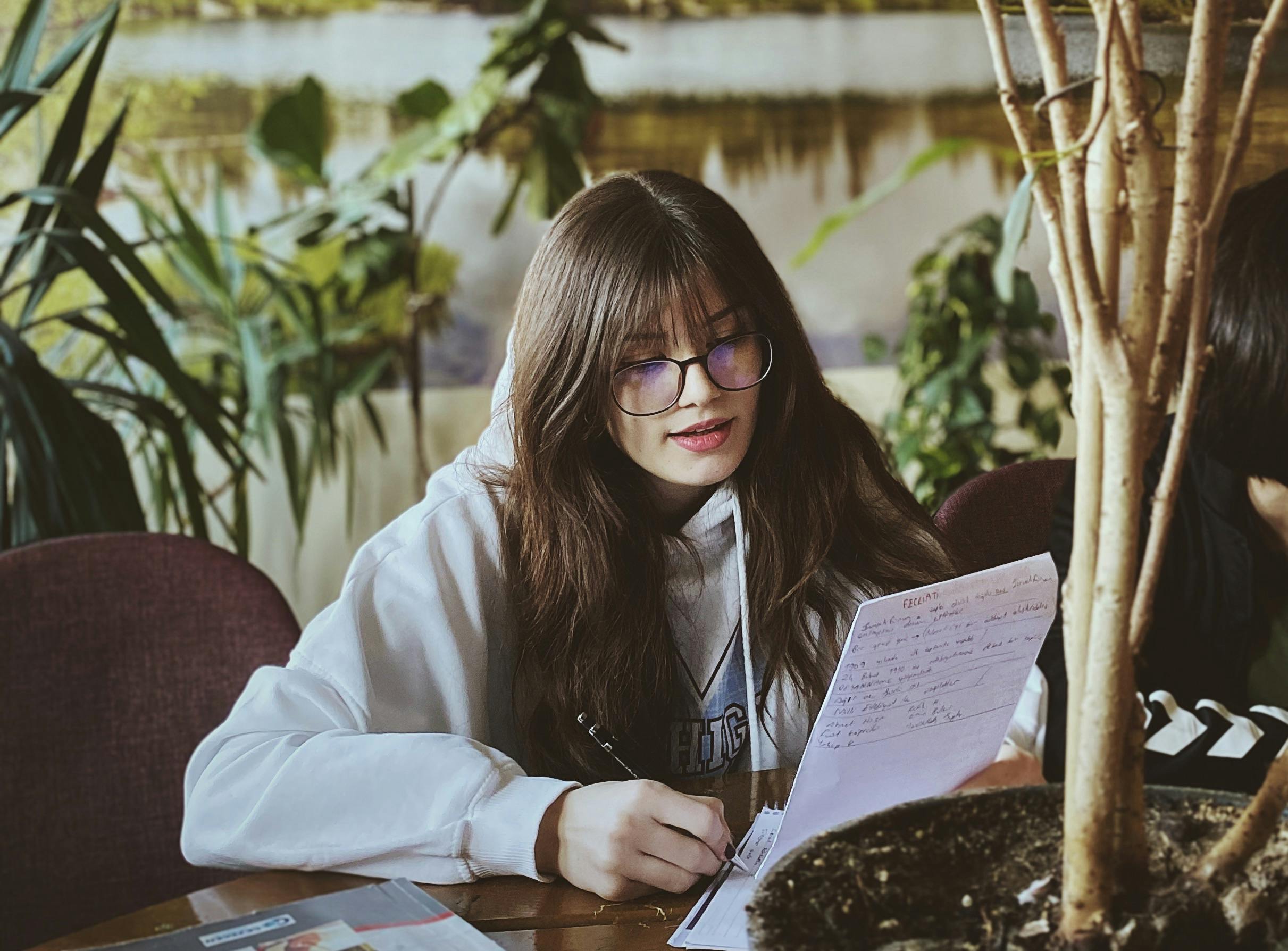 Student Making Notes · Free Stock Photo