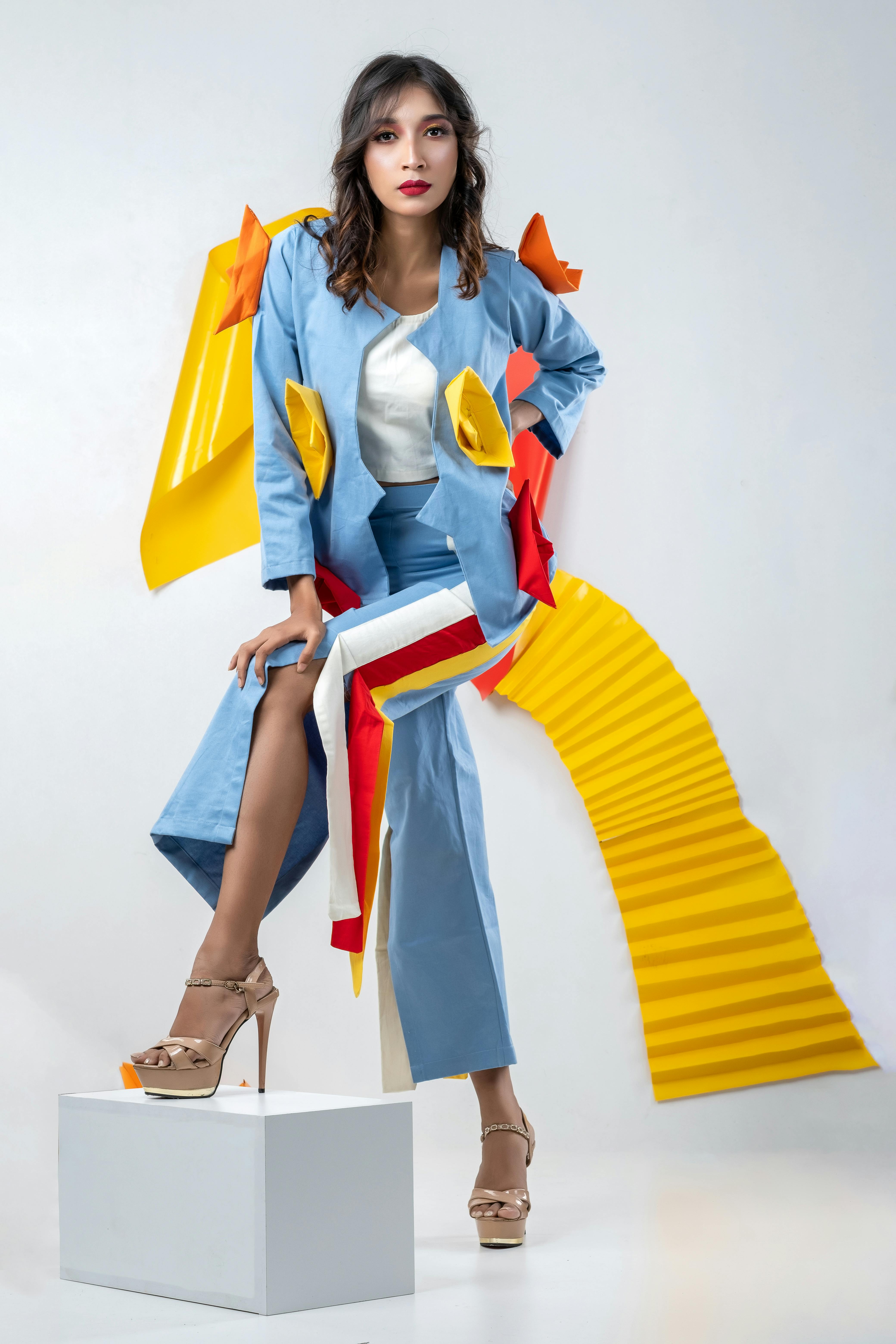 Man and Woman in a Dynamic Pose on a Fashion Photoshoot · Free Stock Photo