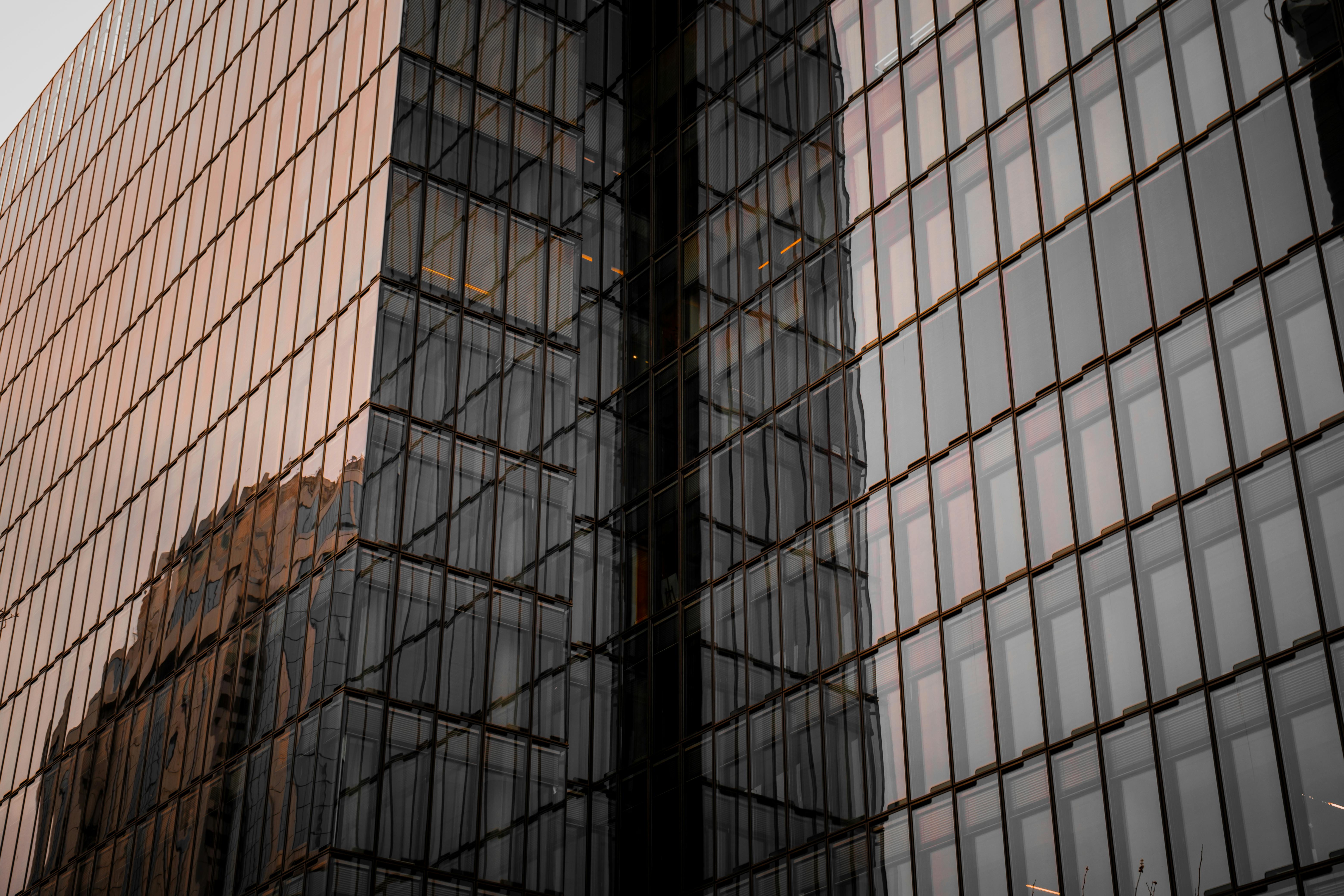 Grey Concrete Round High Rise Building · Free Stock Photo