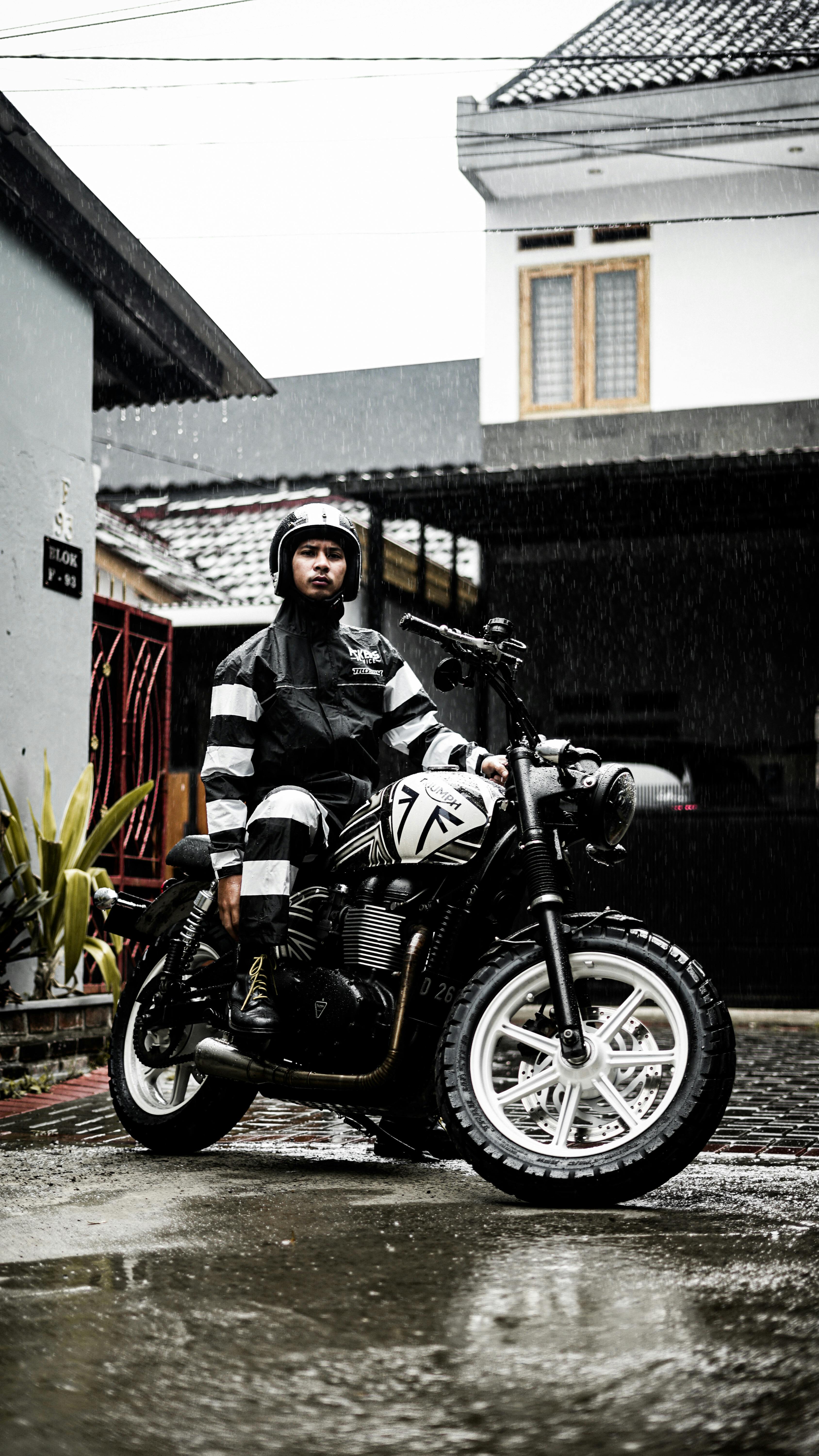 Man on a Motorcycle in Rain · Free Stock Photo