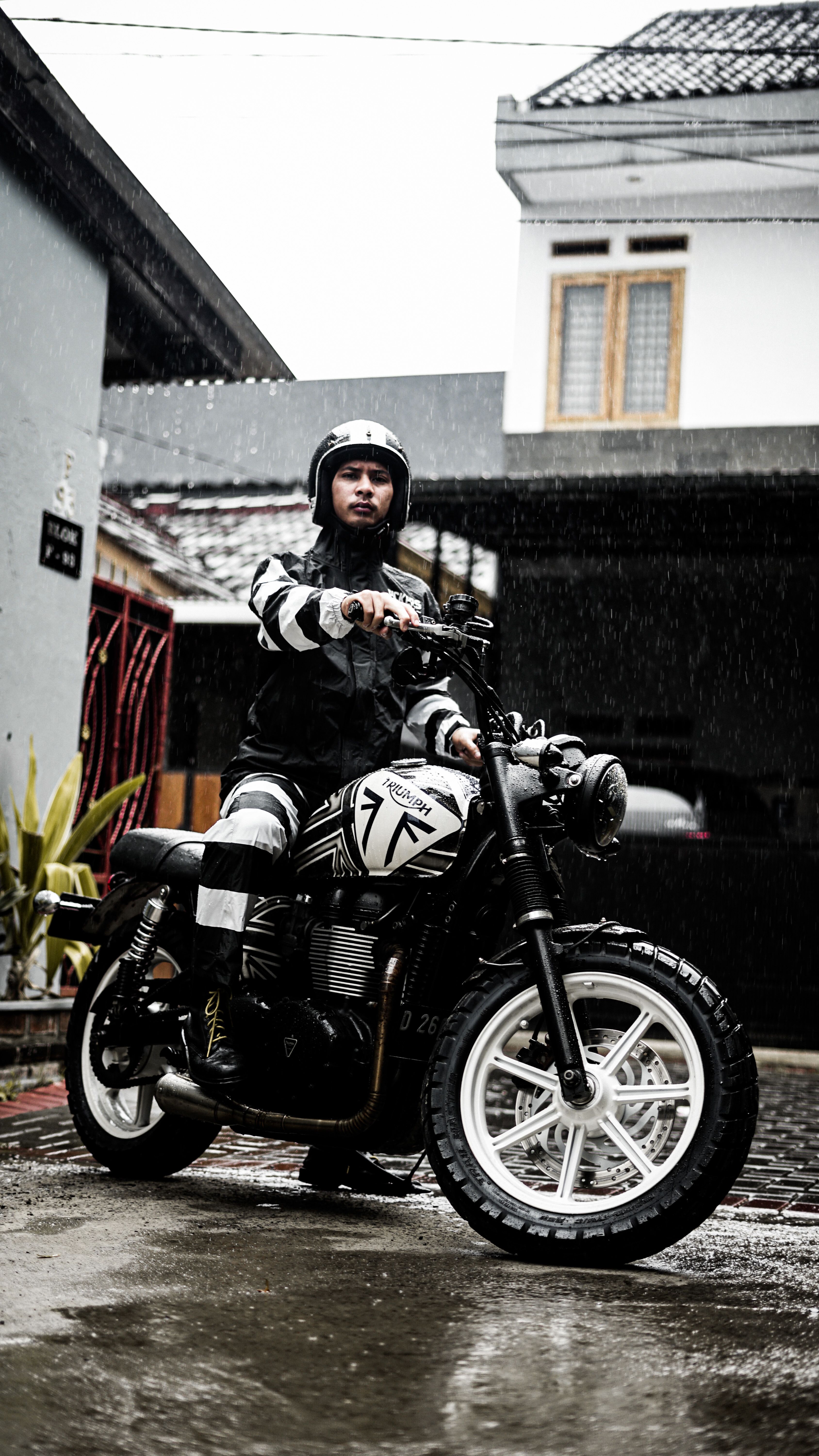 Photo of a Biker Sitting on a Motorcycle Parked in an Alley · Free ...