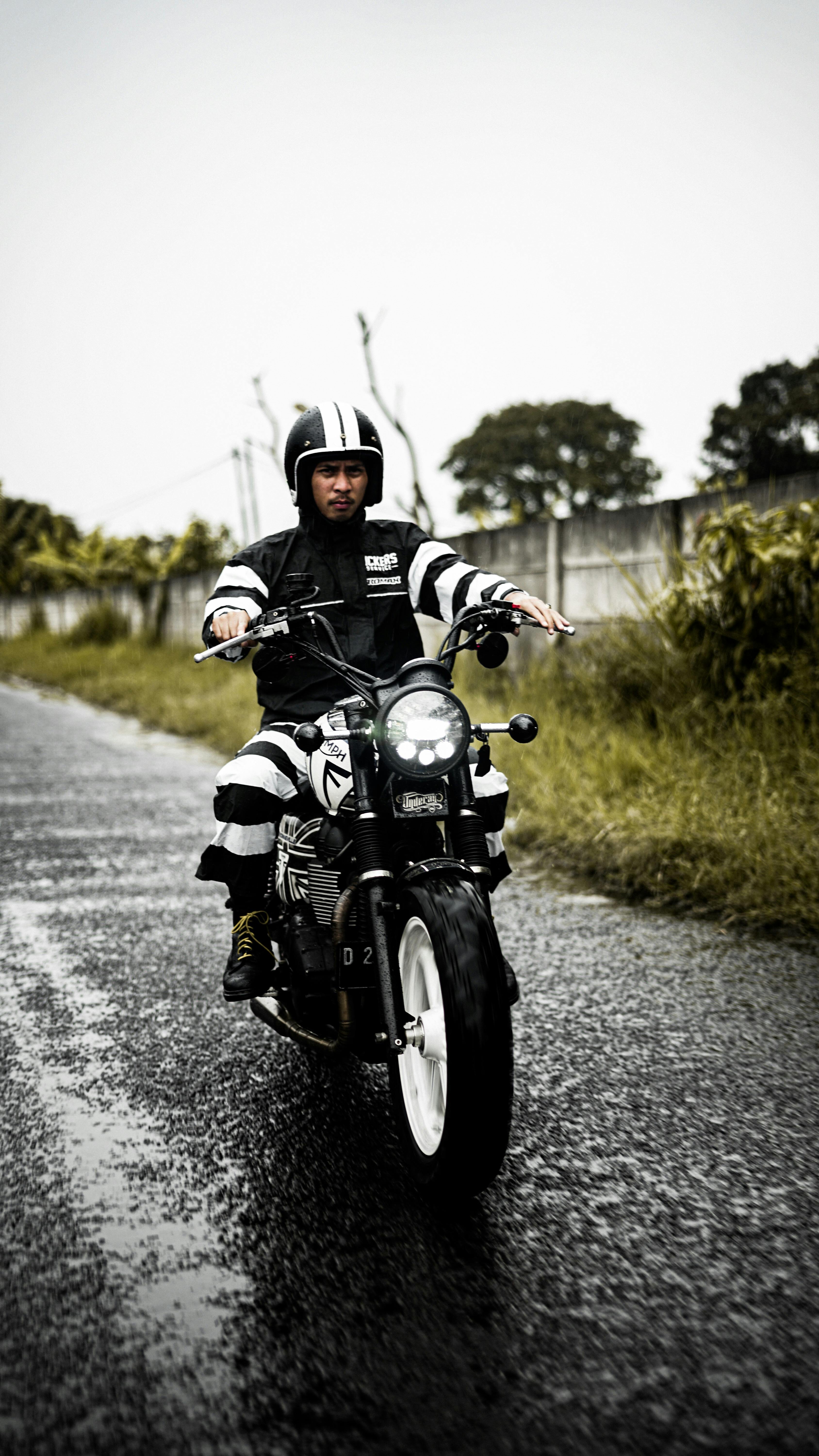 Biker with Helmet on Motorcycle · Free Stock Photo