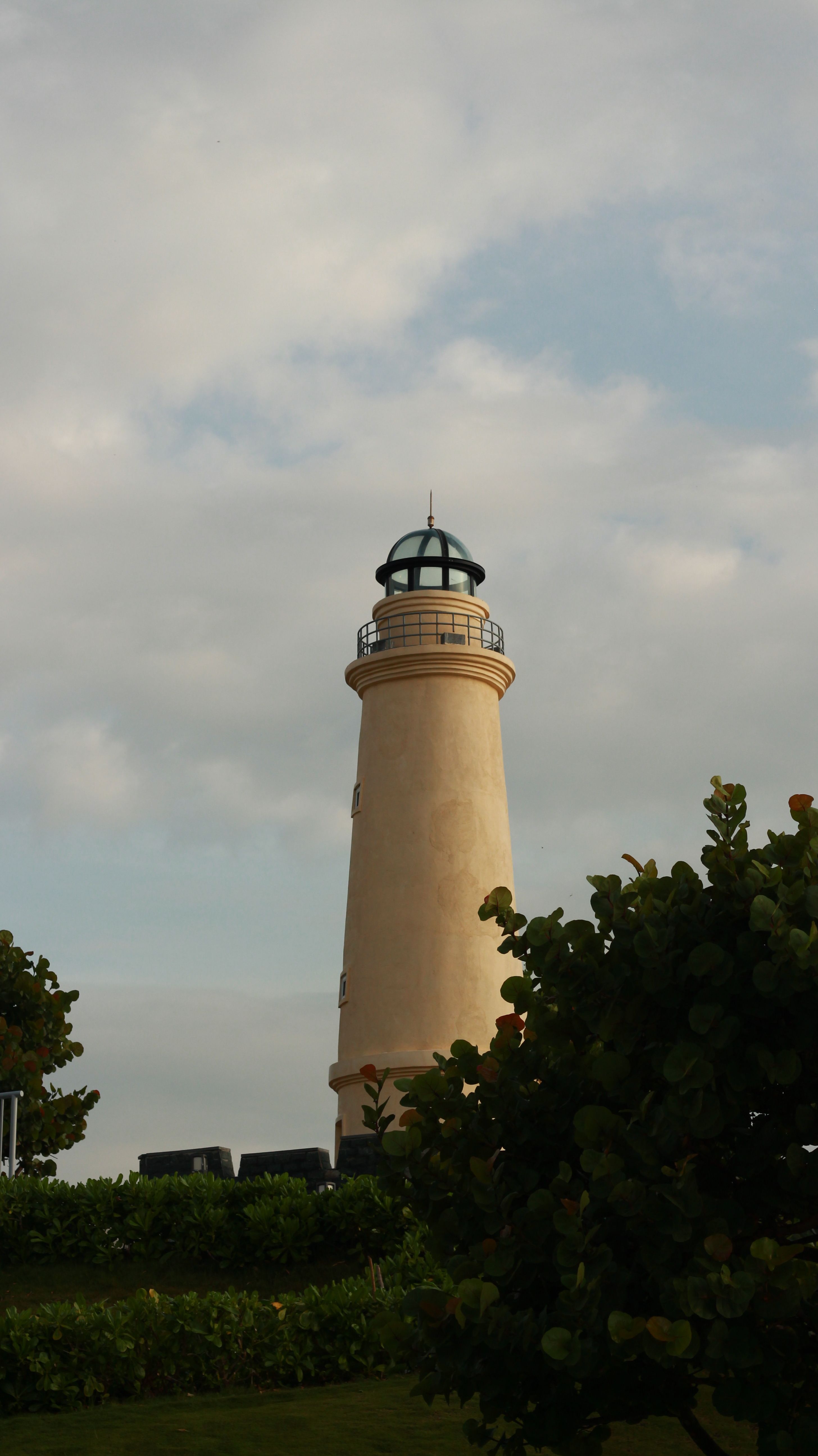 Seashore with Lighthouse · Free Stock Photo