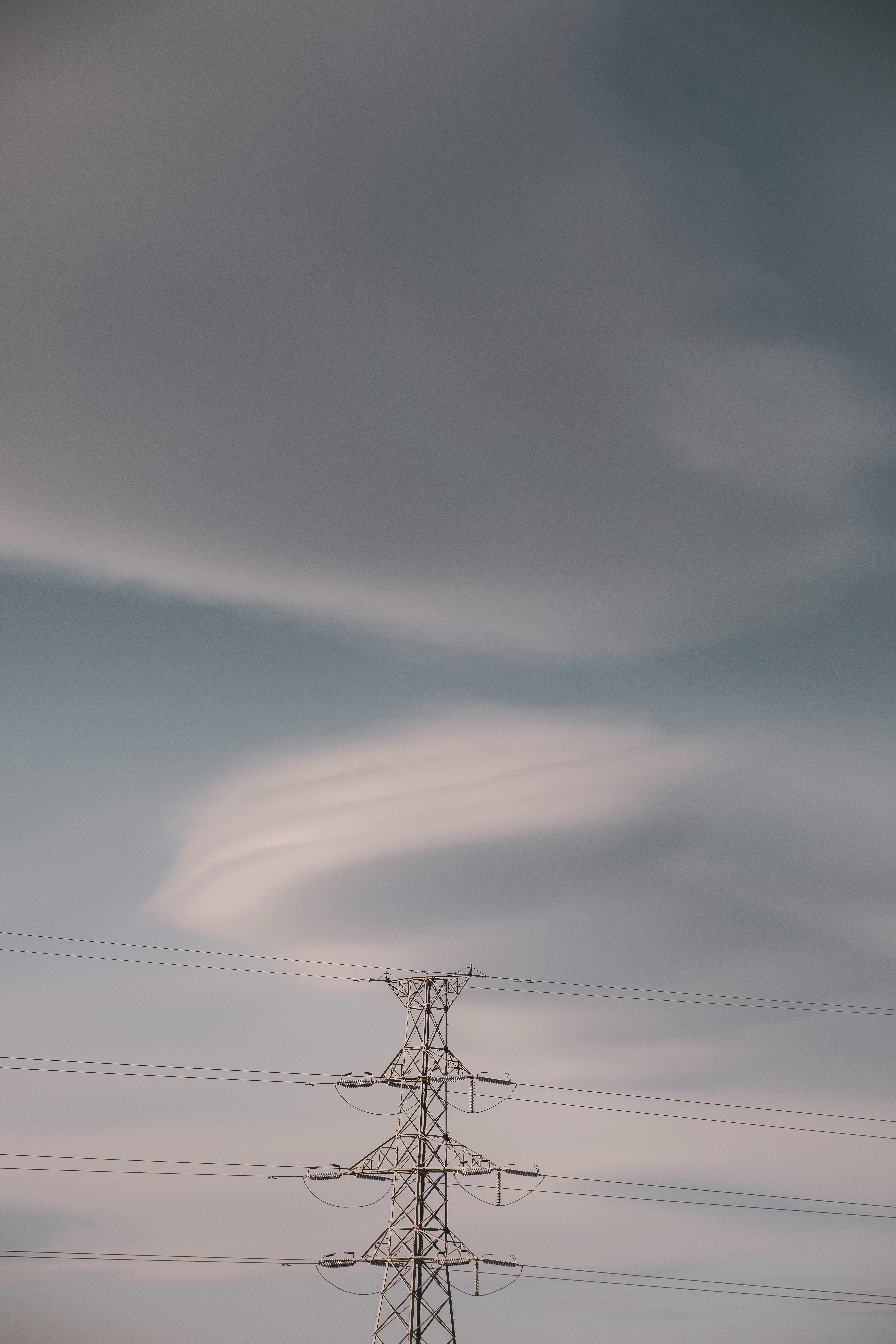 Electric Lines Over Cloudy Sky · Free Stock Photo