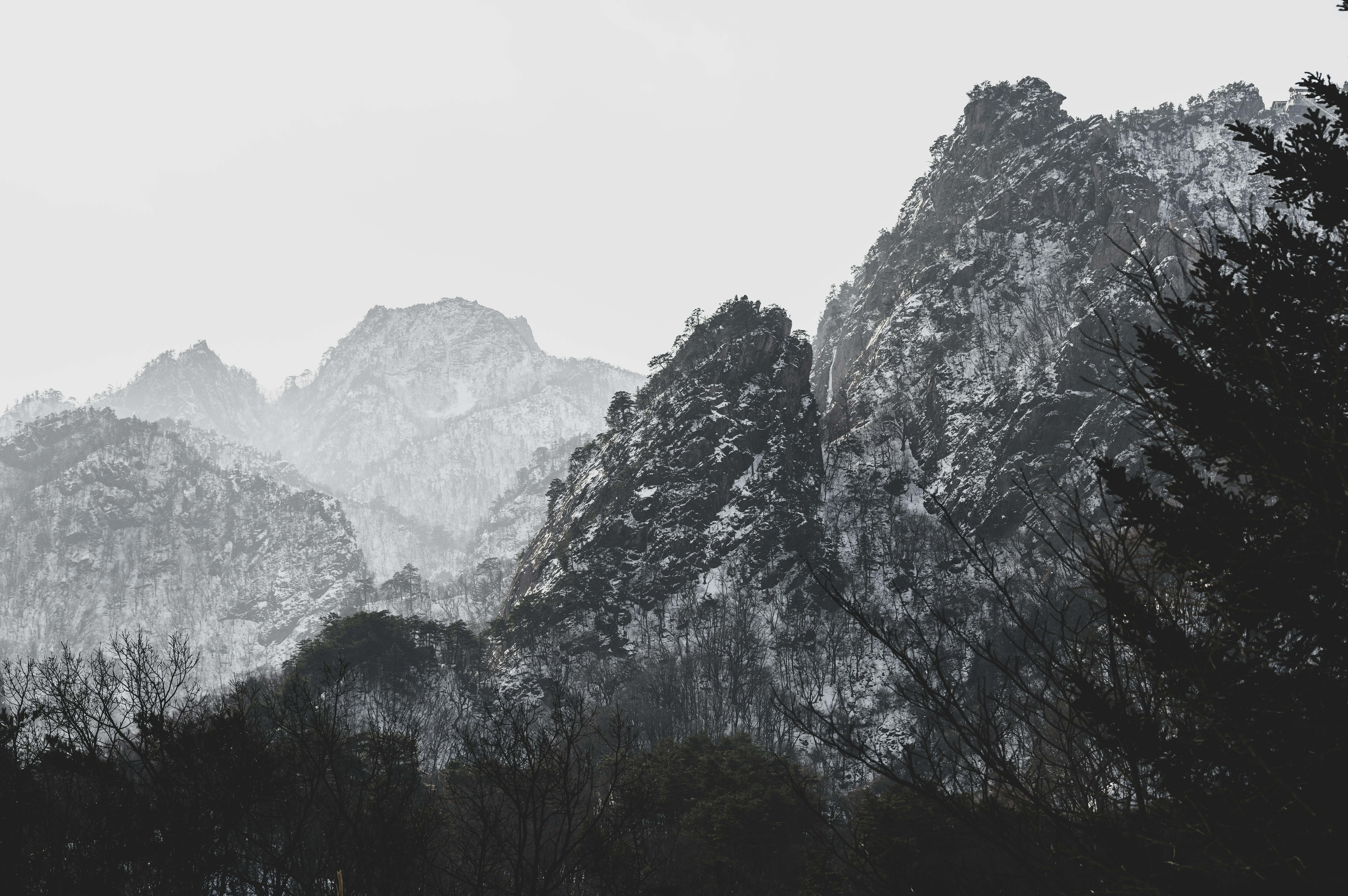 Grayscale Photography of Rocky Mountains · Free Stock Photo