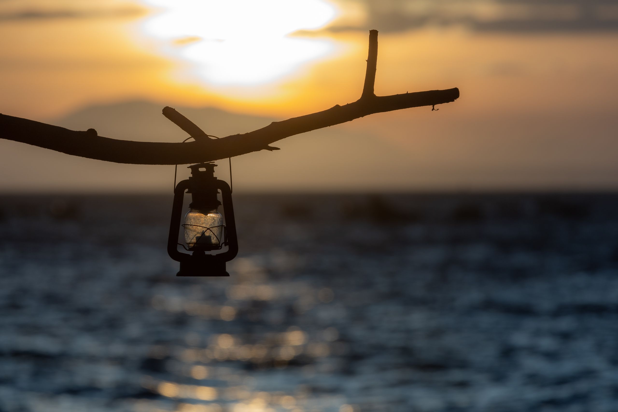 A Lantern by a Sea · Free Stock Photo