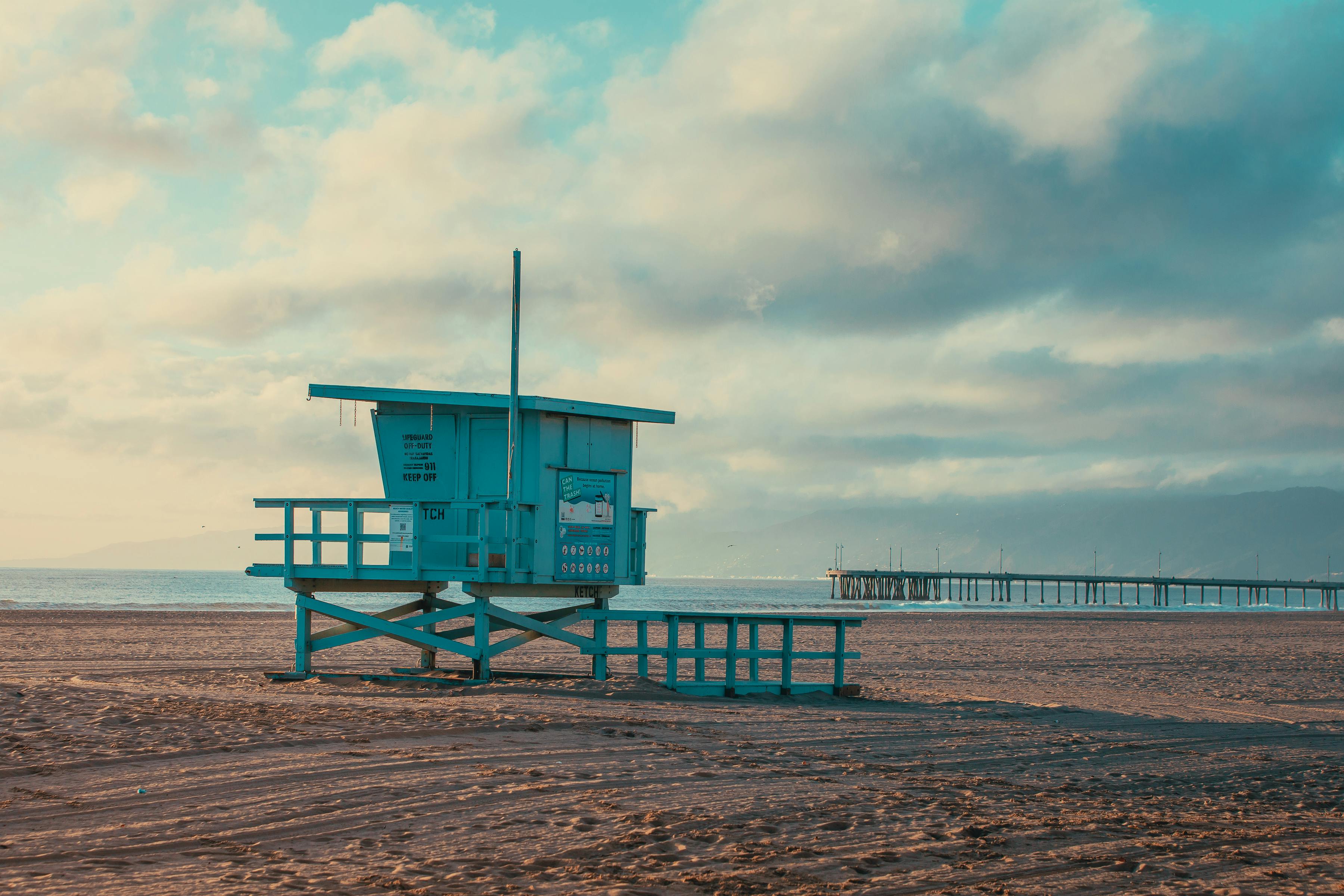Blue Lifeguard Tower on the Sandy Beach at Dawn · Free Stock Photo