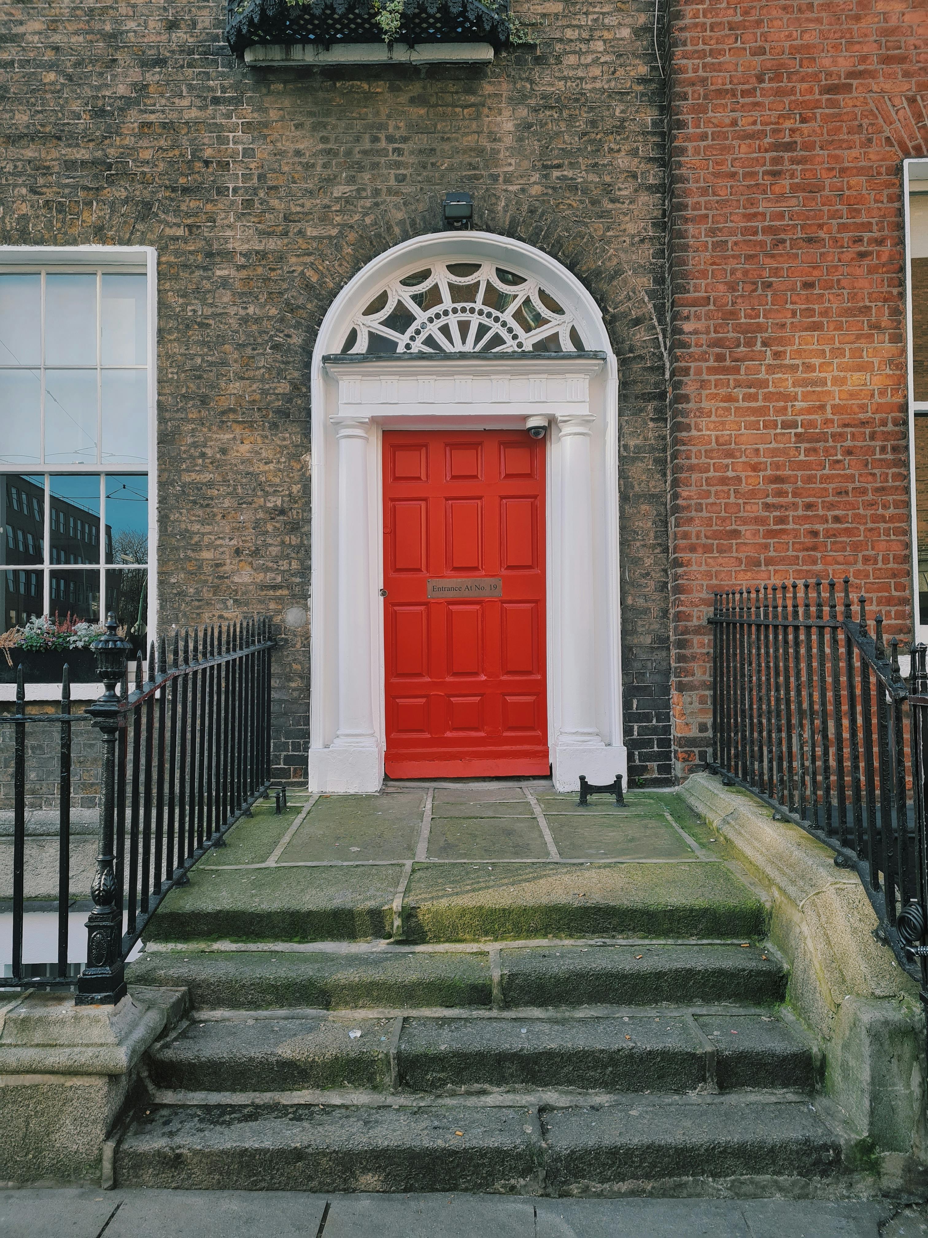 Brick Building Red Door · Free Stock Photo