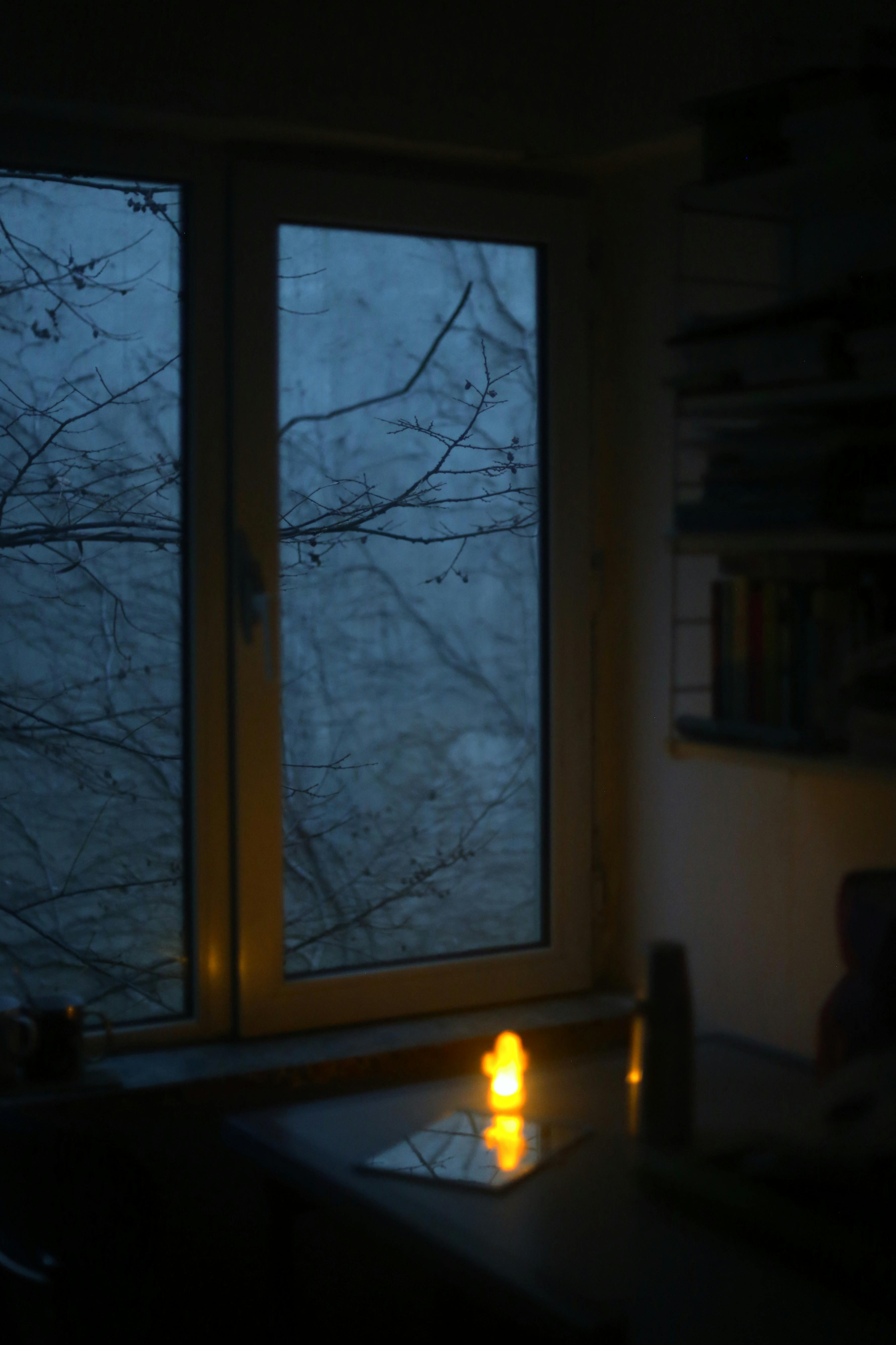 Mirror and Lights on Table near Windows in Evening · Free Stock Photo