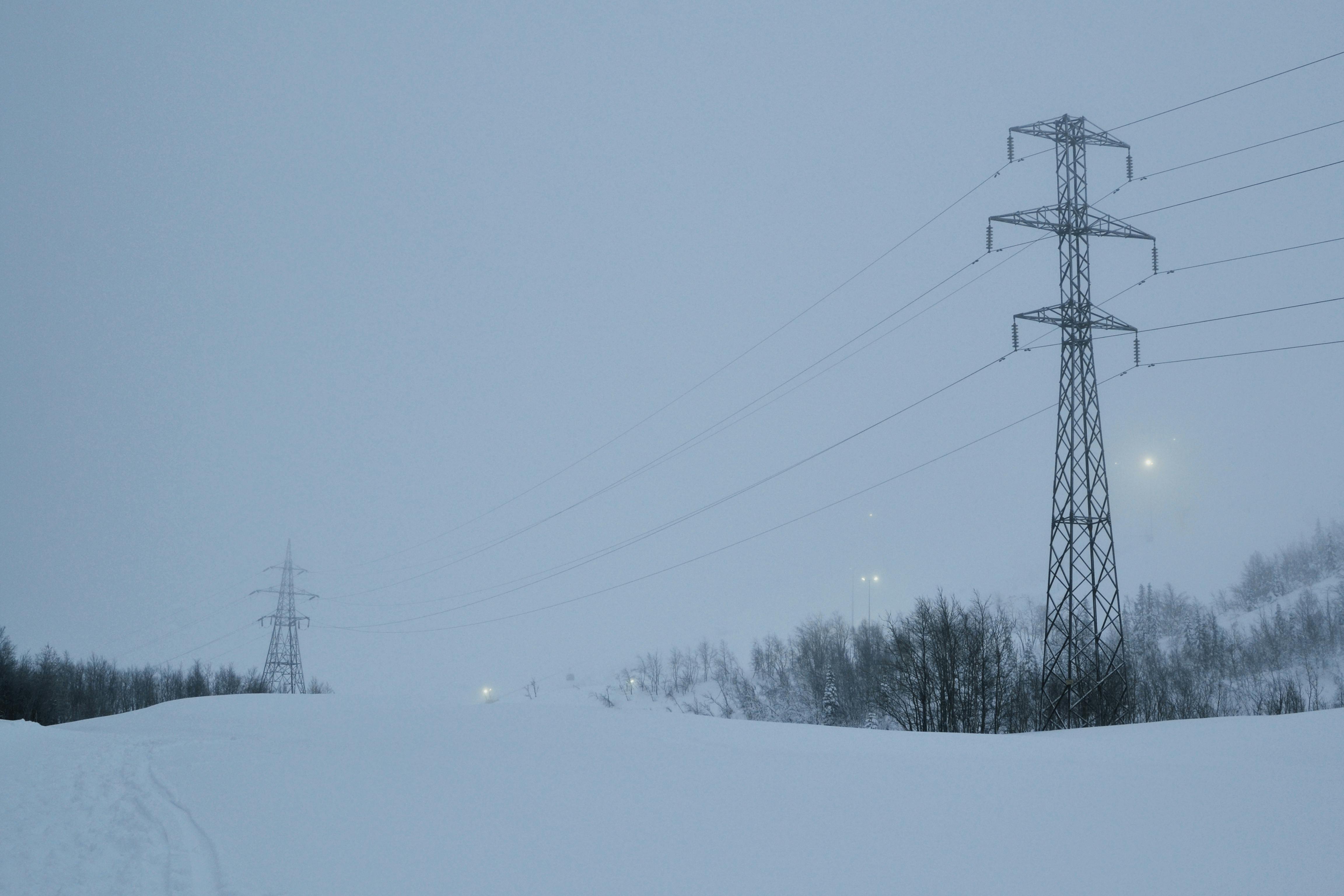Snow around Transmission Towers · Free Stock Photo
