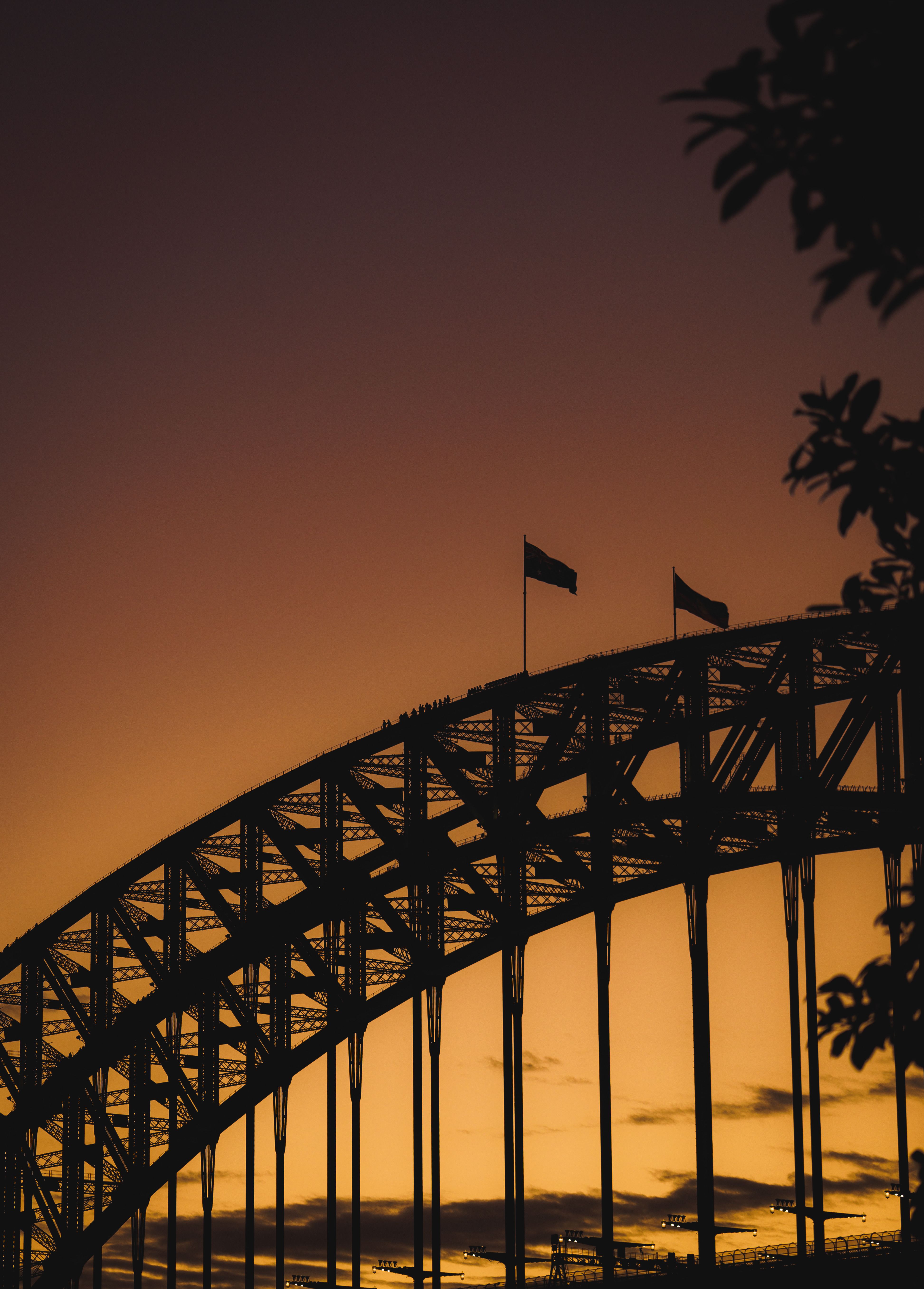 Low Angle Shot of Bridge and Streetlamp at Dawn · Free Stock Photo