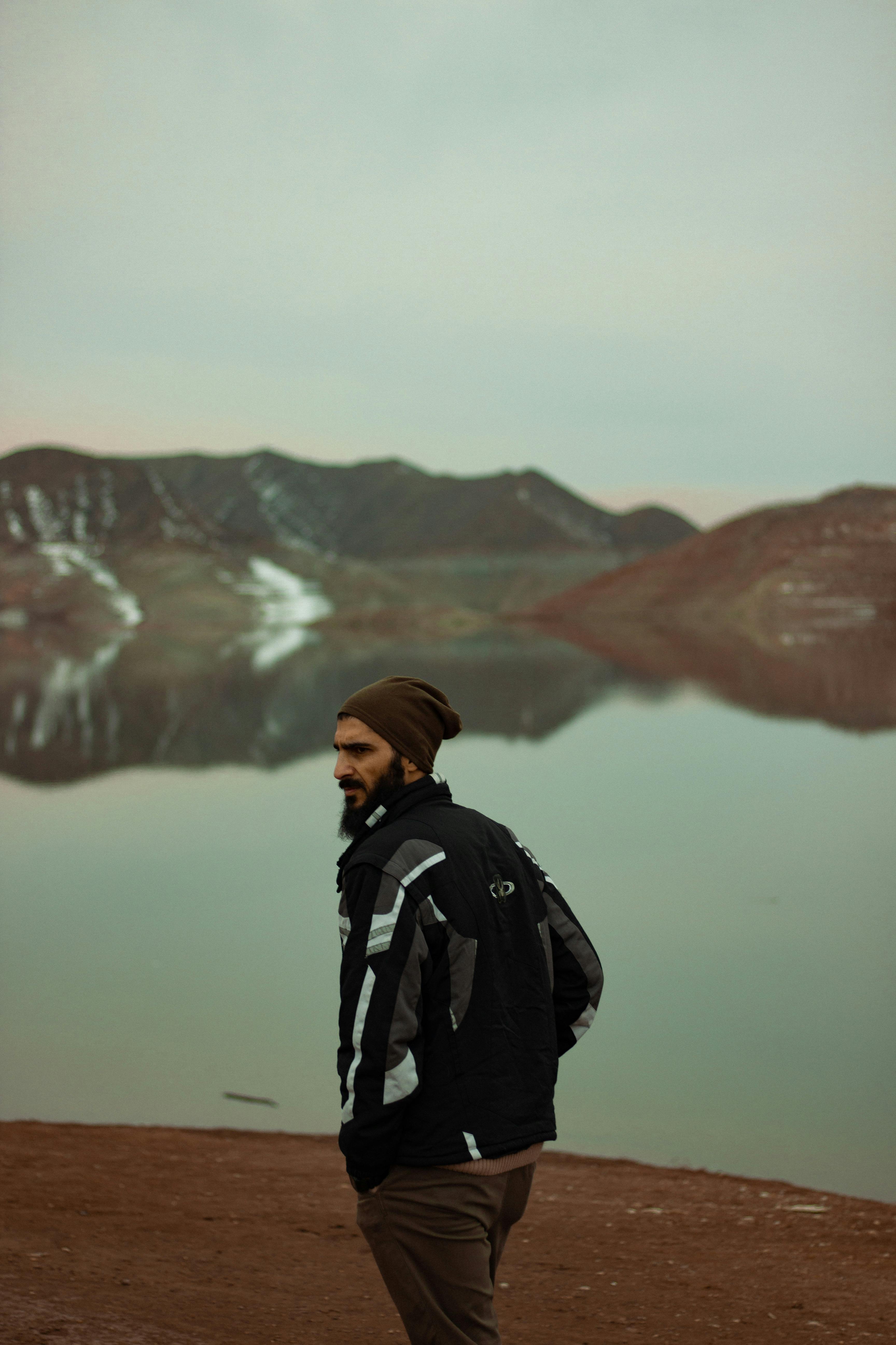 Backpacker by Lake · Free Stock Photo