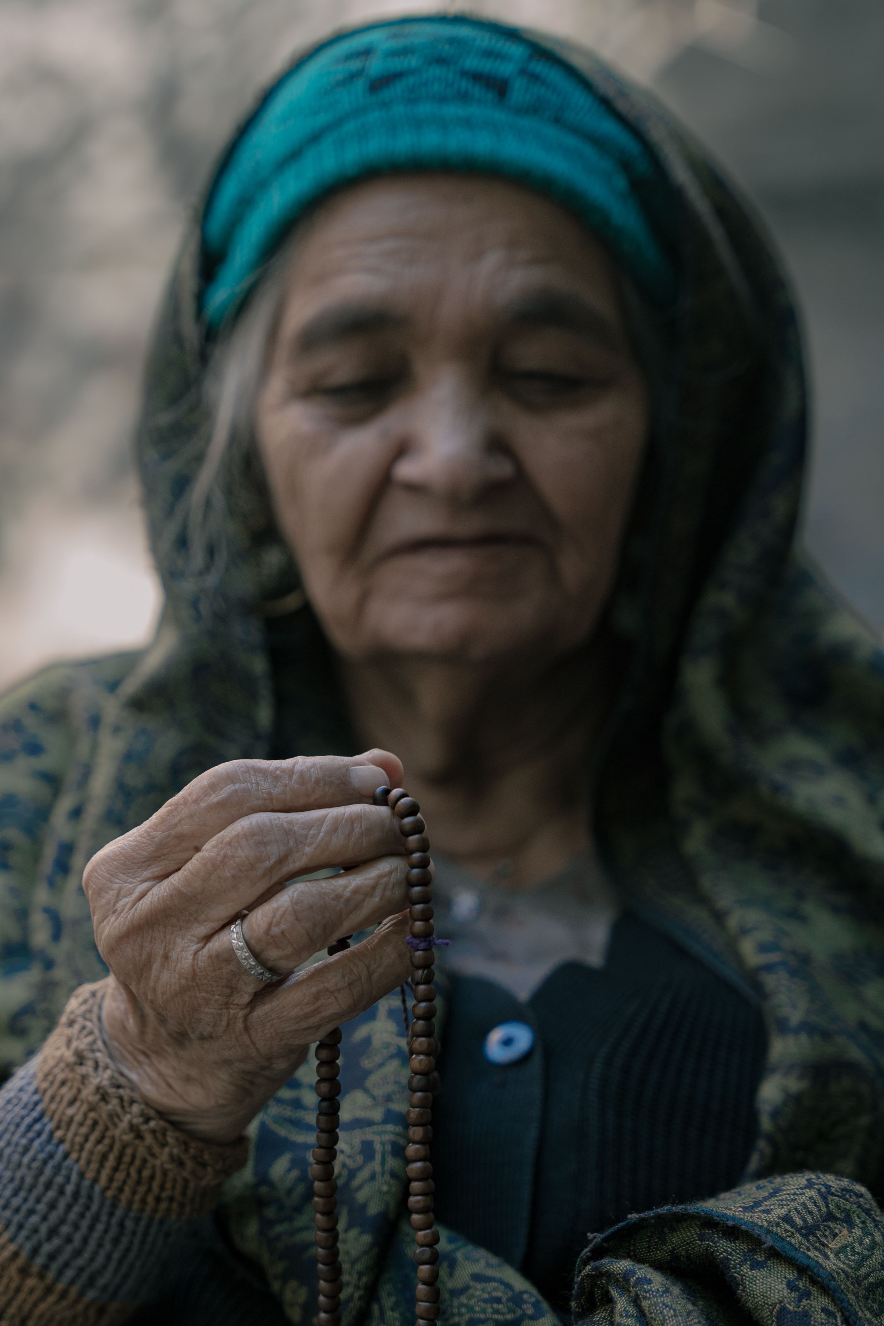 Close-Up Shot of a Woman Praying · Free Stock Photo