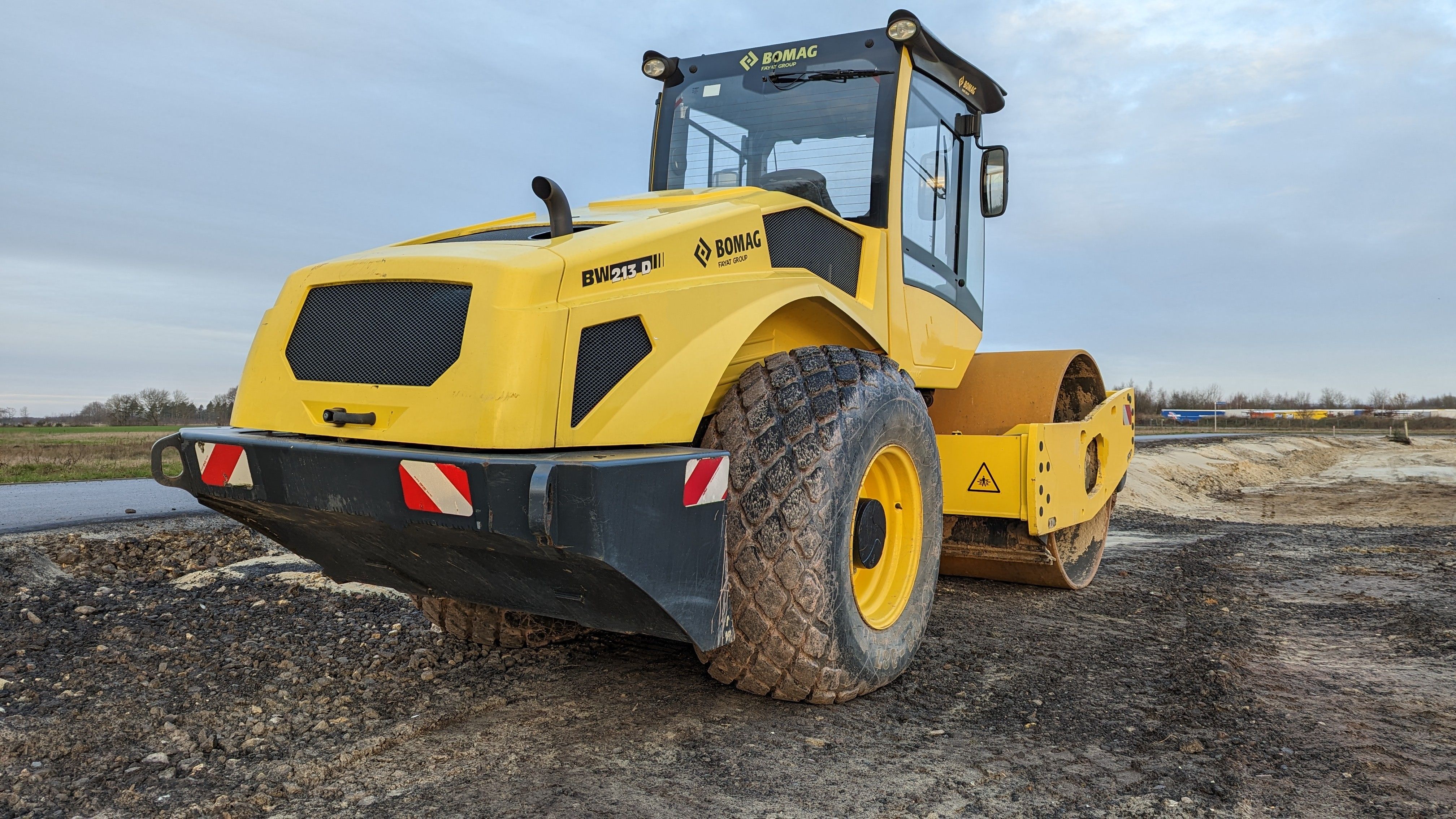 Yellow Road Roller near Road · Free Stock Photo