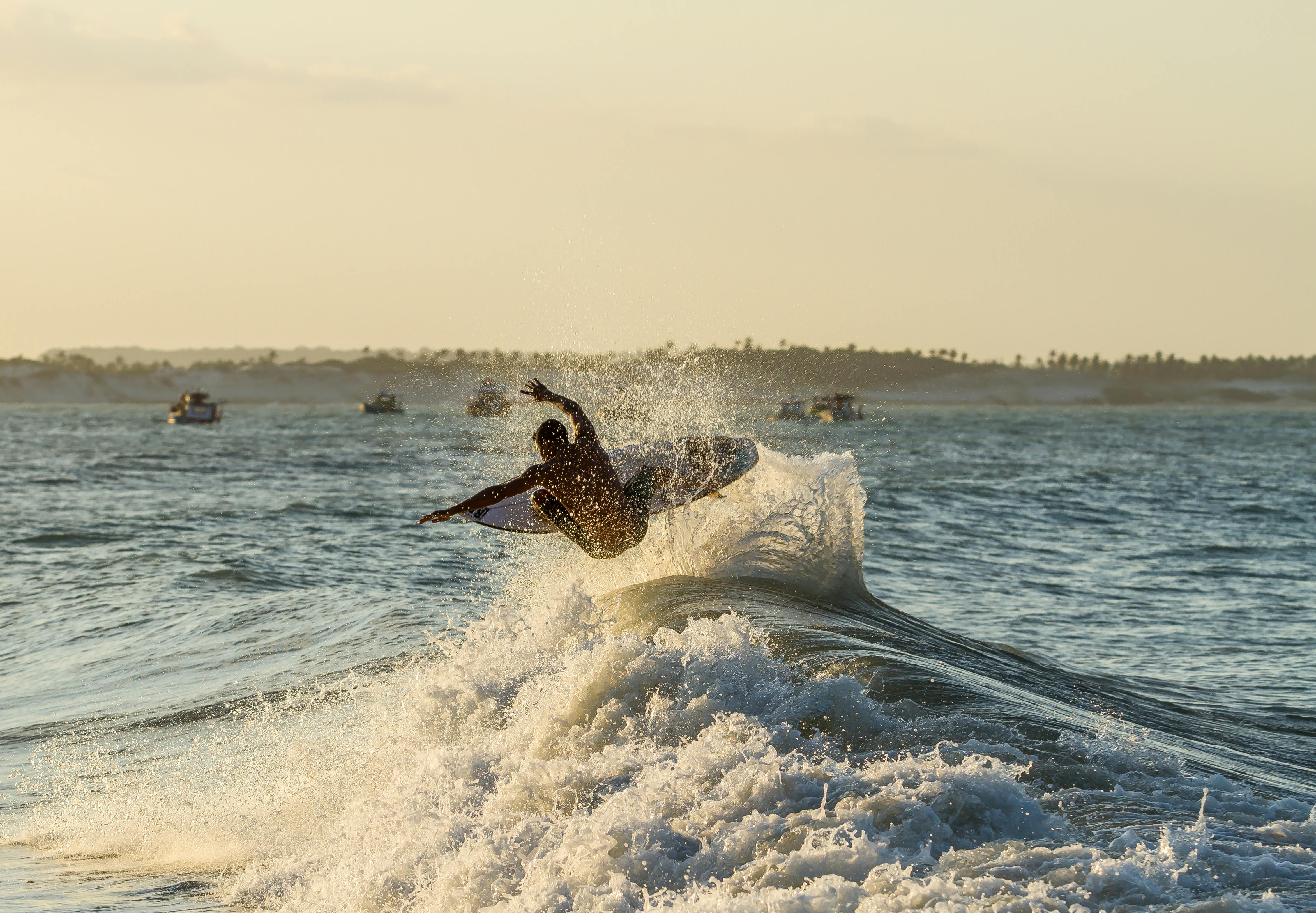 Person Surfboarding · Free Stock Photo