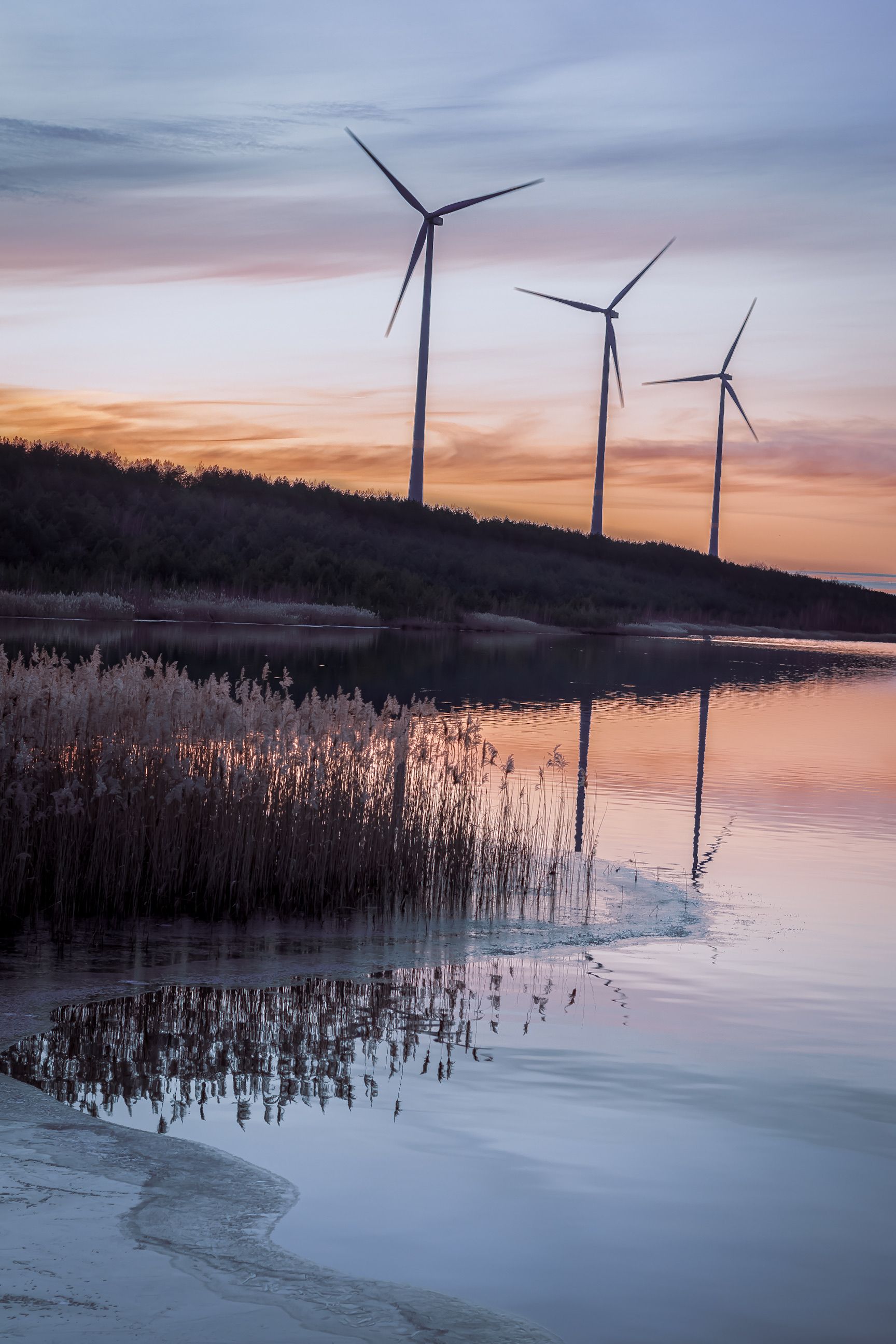 Wind Turbines behind Lake at Sunset · Free Stock Photo