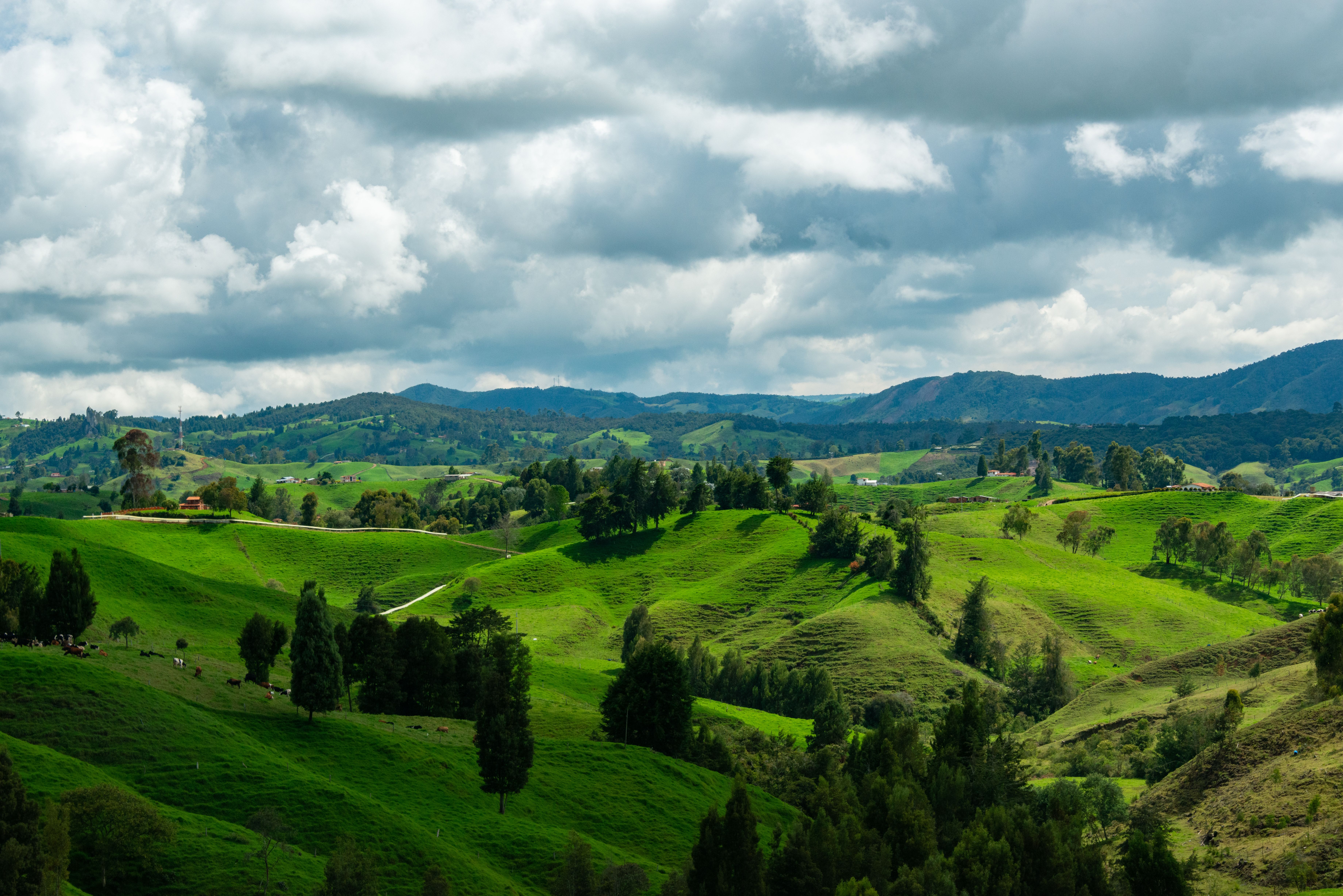 Clouds over Green Hills · Free Stock Photo