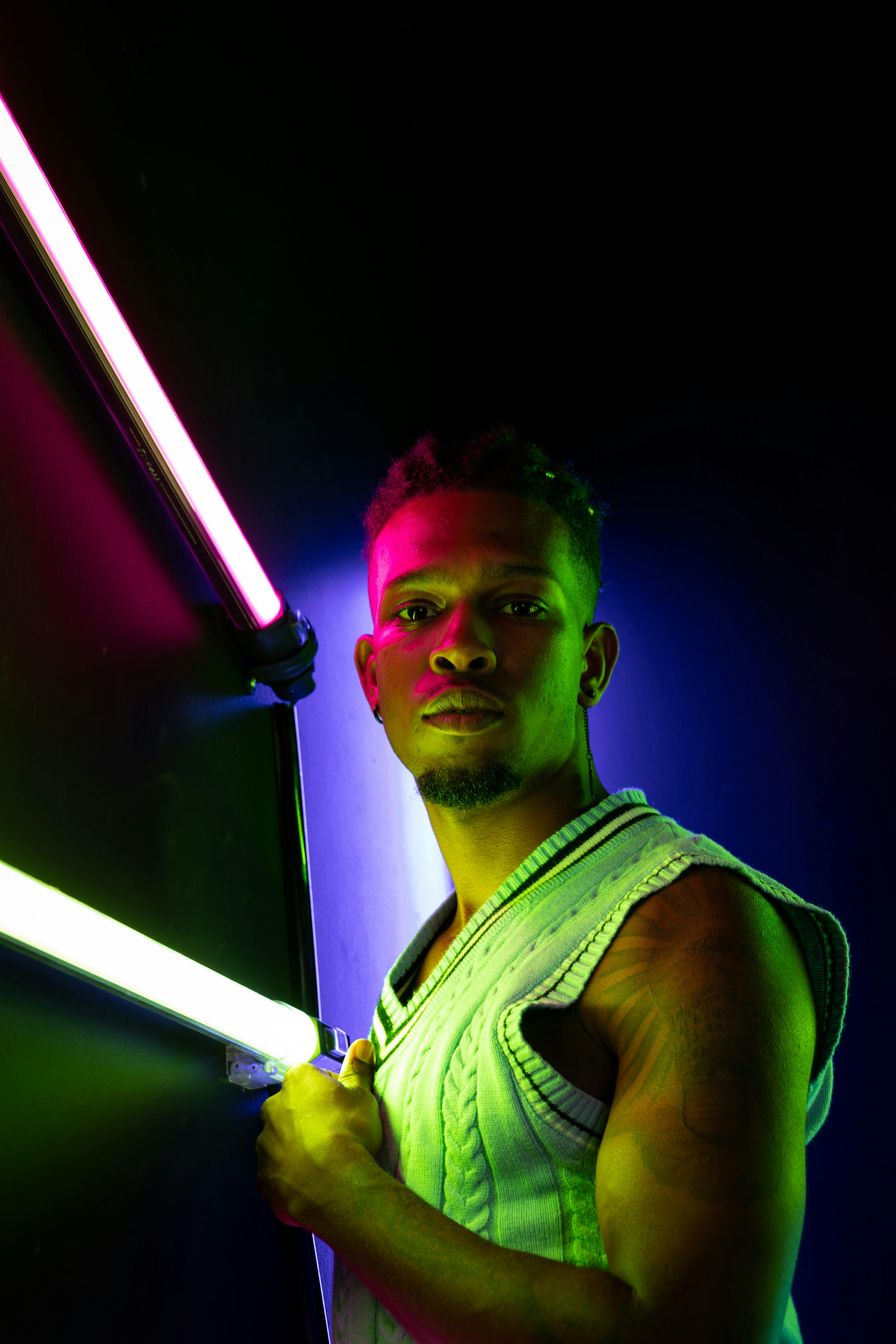 Green Light over Man in Tank Top · Free Stock Photo