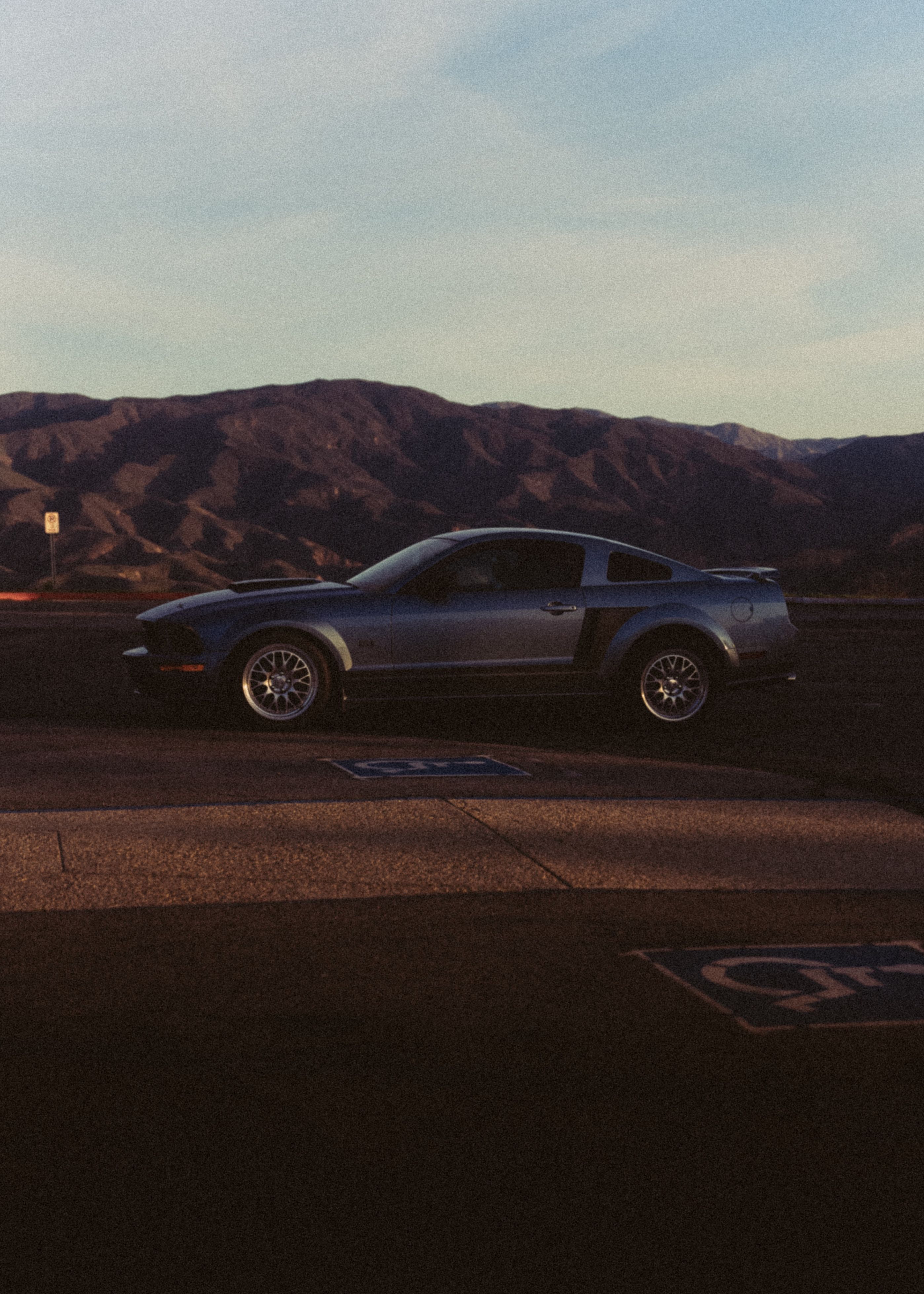 Luxurious Car Parked in Parking Lot in Countryside · Free Stock Photo