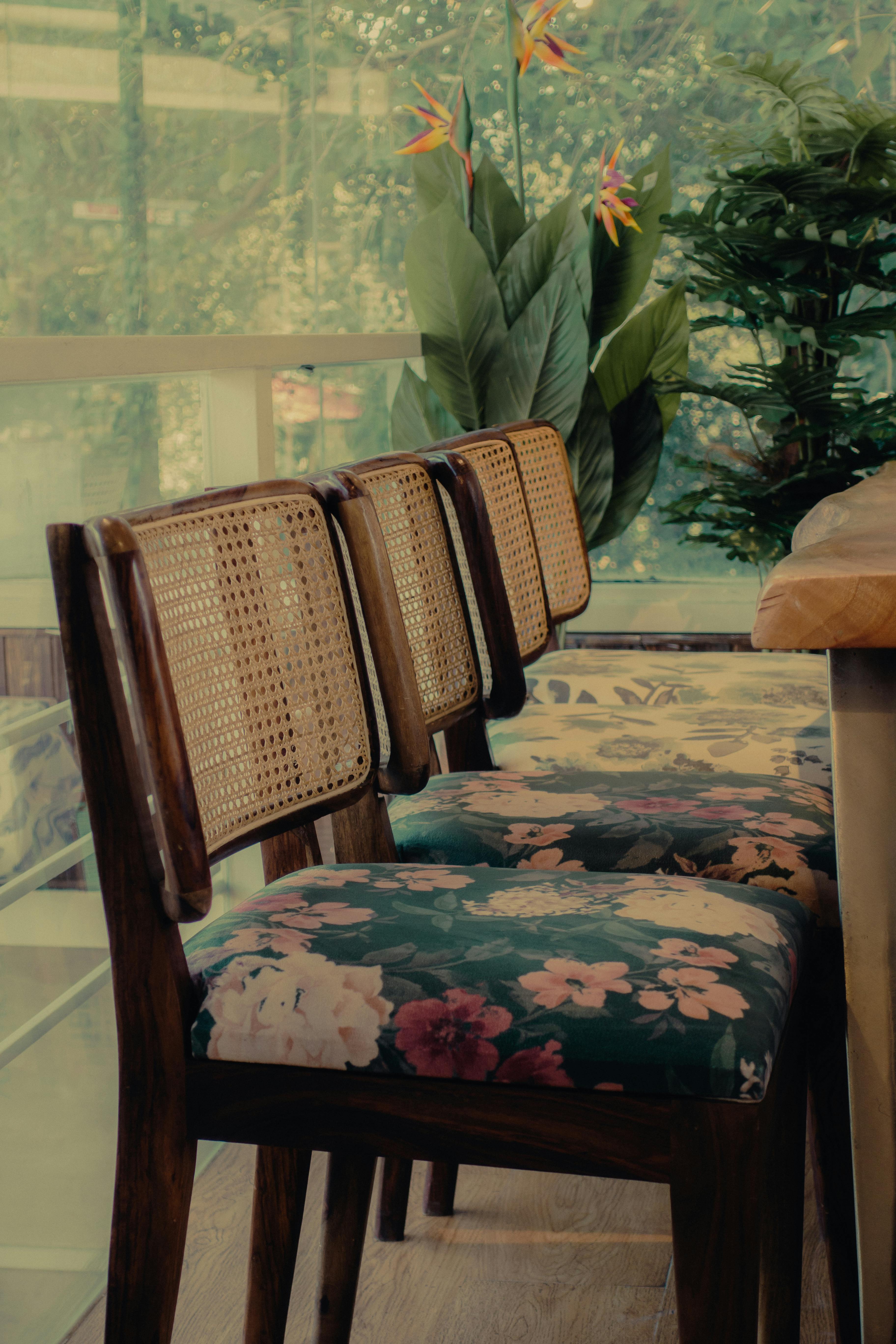 Decorated Chairs near Window · Free Stock Photo
