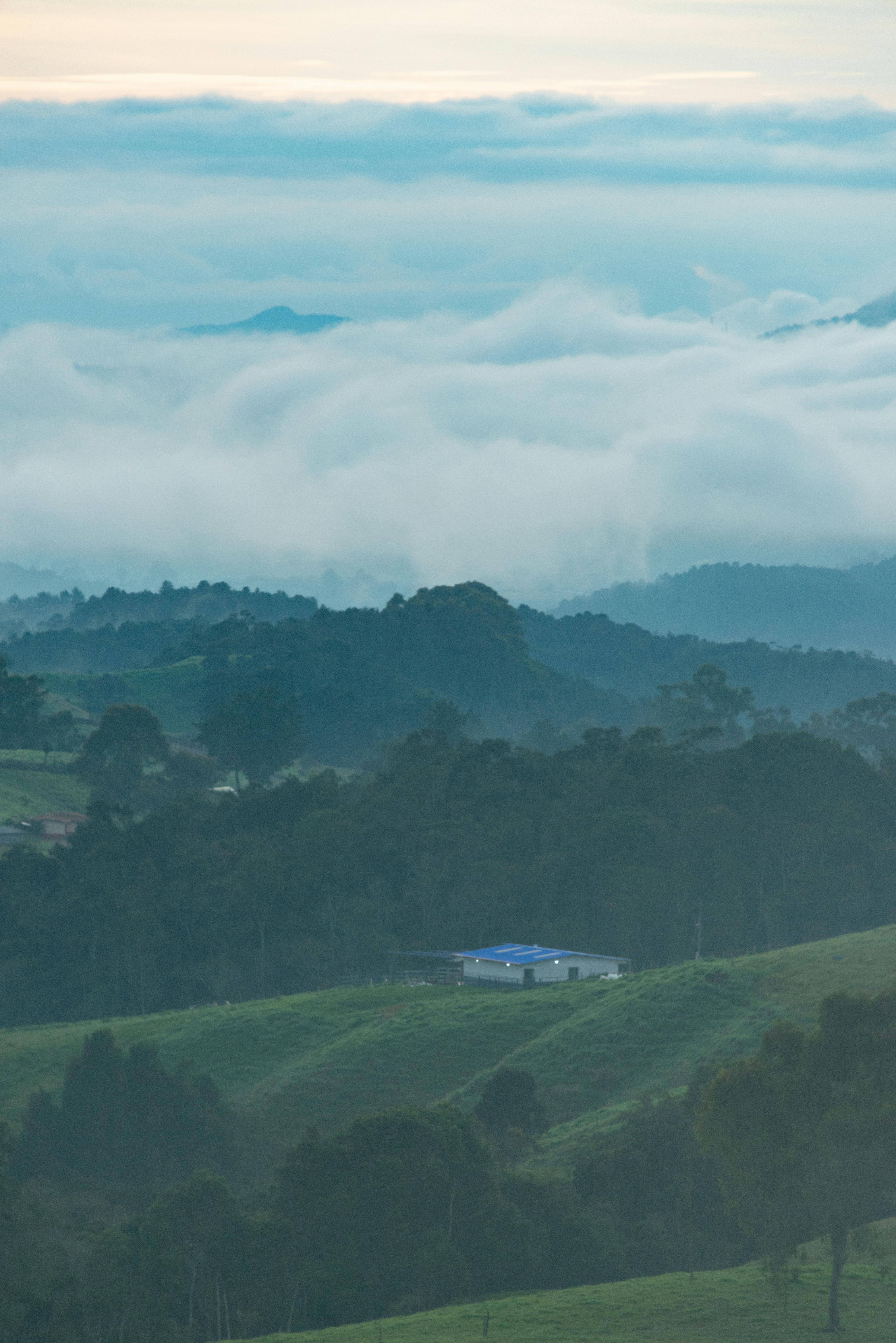 House in the Mountains Covered by Fog · Free Stock Photo