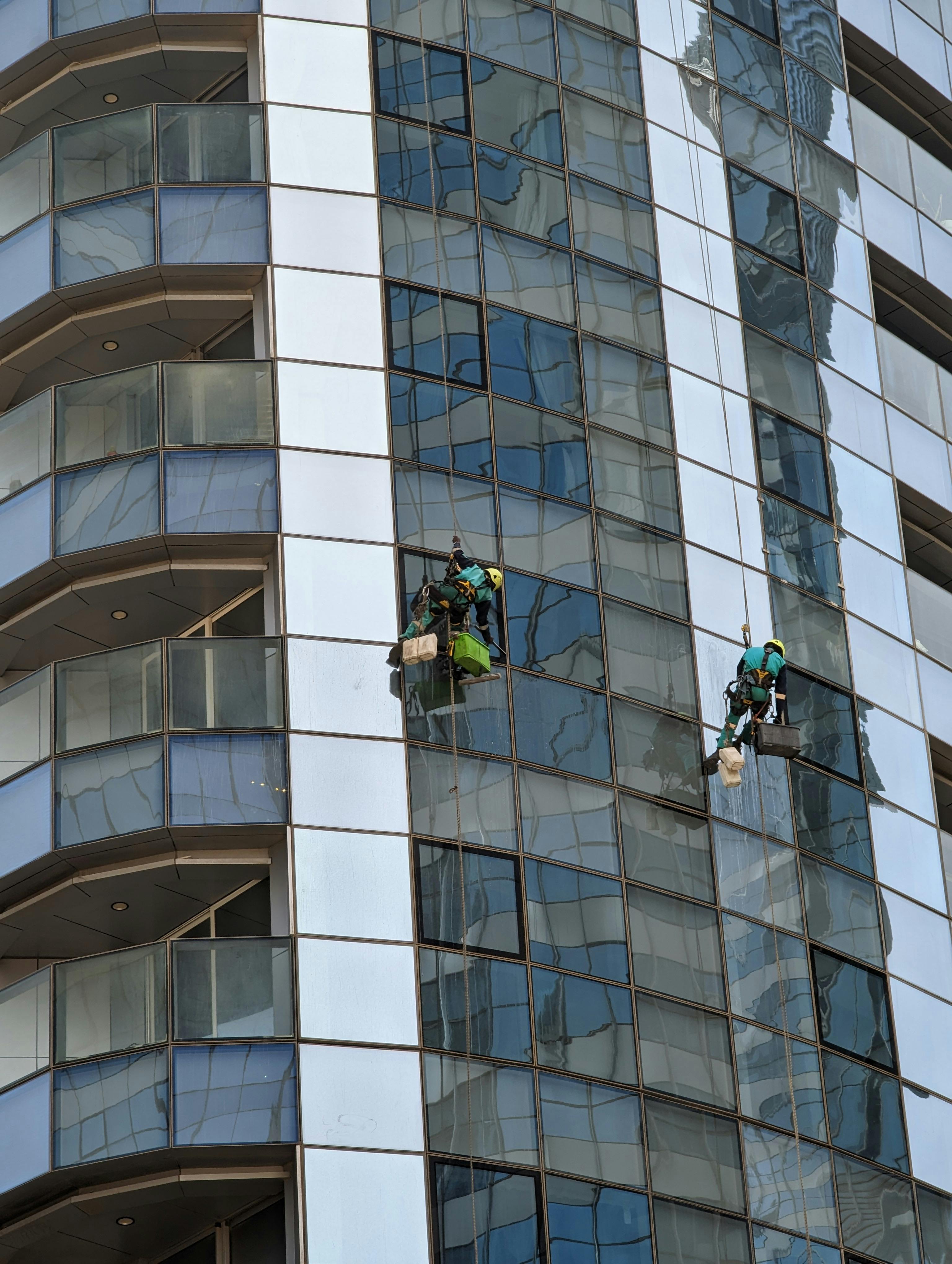 Photo of a Man Cleaning Windows · Free Stock Photo